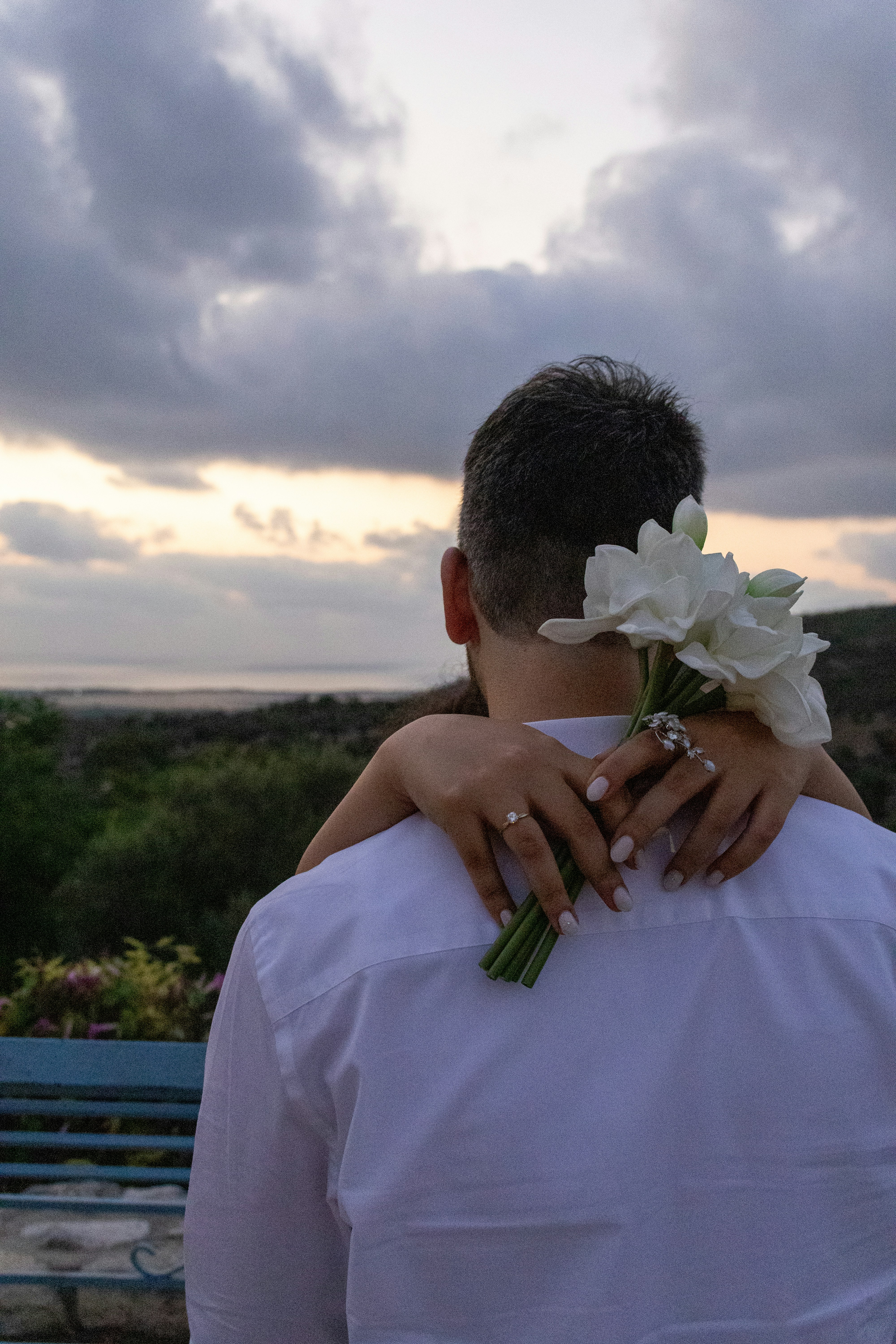 Bouquet of Quiet Moments: Hands around the Groom