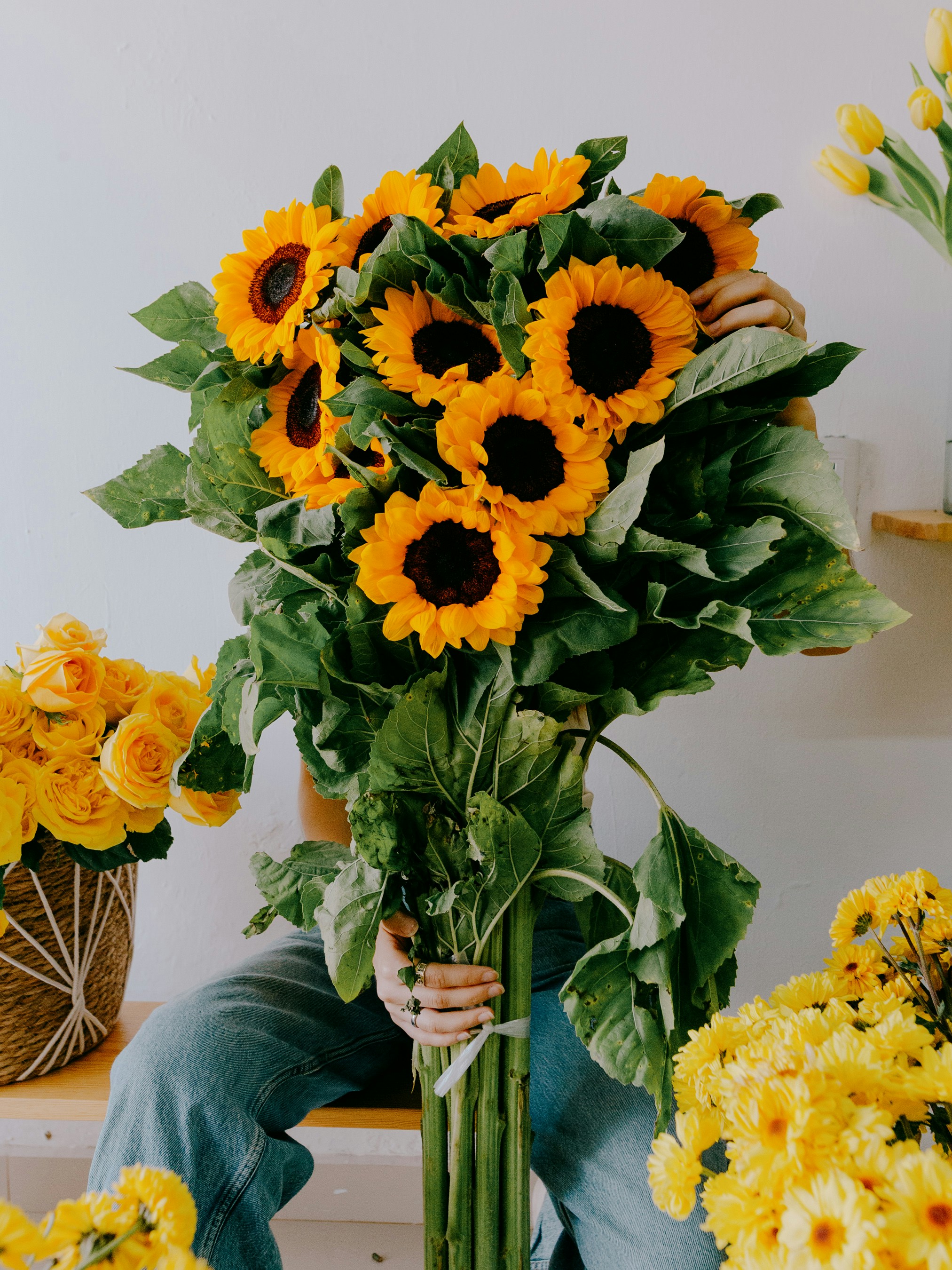 Sunflower Cascade: A bouquet of sunlit blooms brimming with yellow cheer