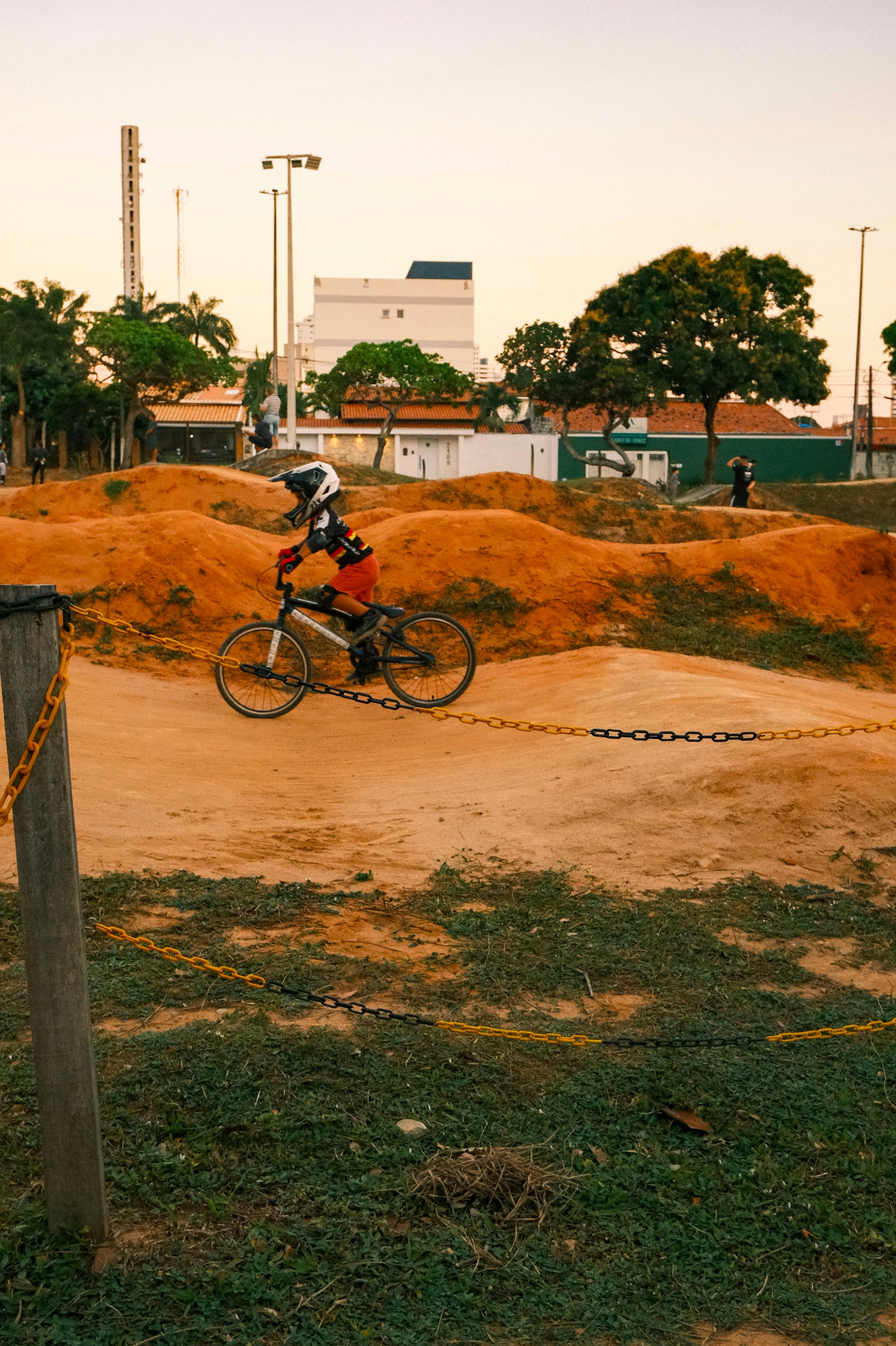 Dusty BMX Flip: A Rider Carves the Park at Golden Hour