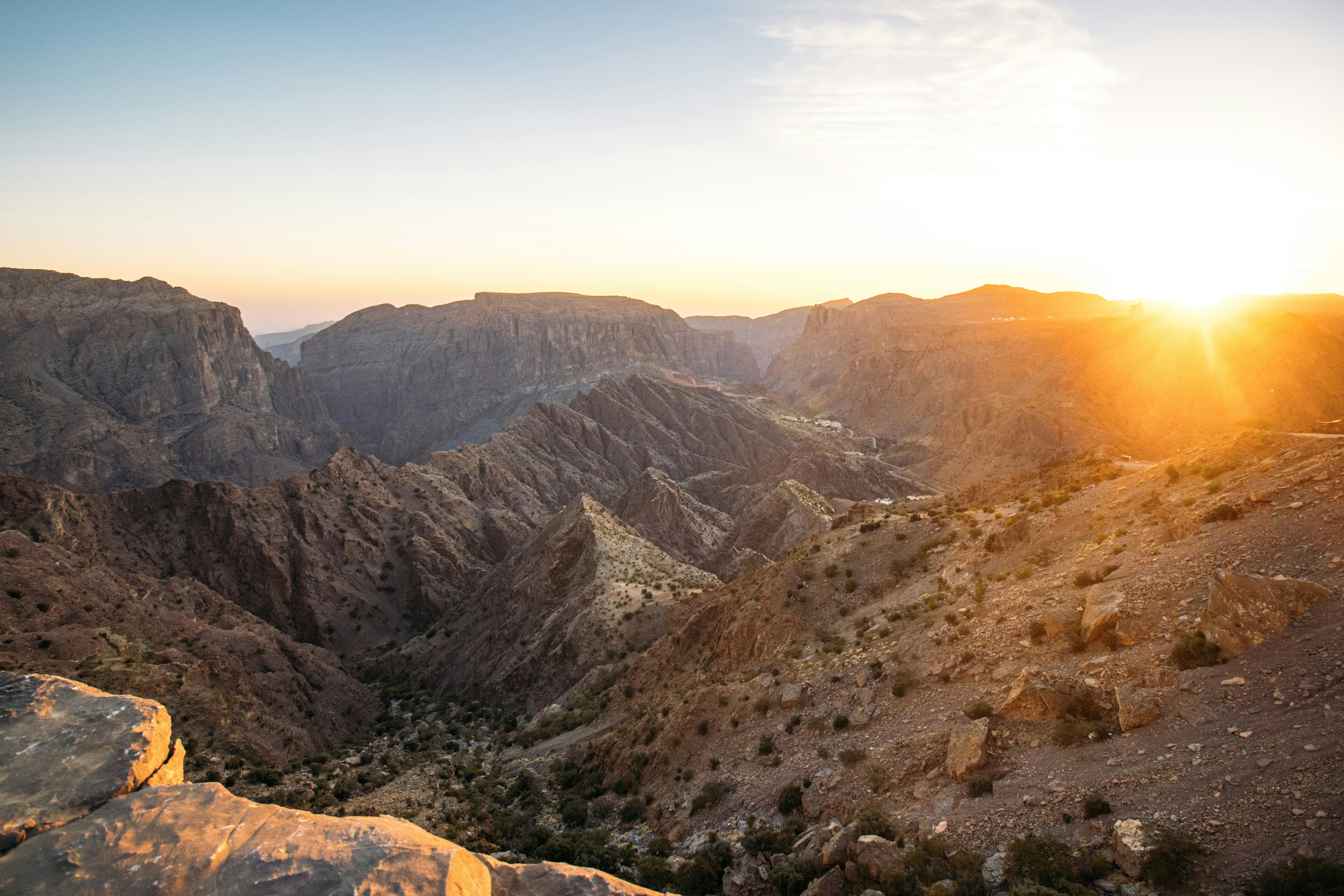 Dawn over Wind-Worn Valleys: Carved Light at the Canyon Rim