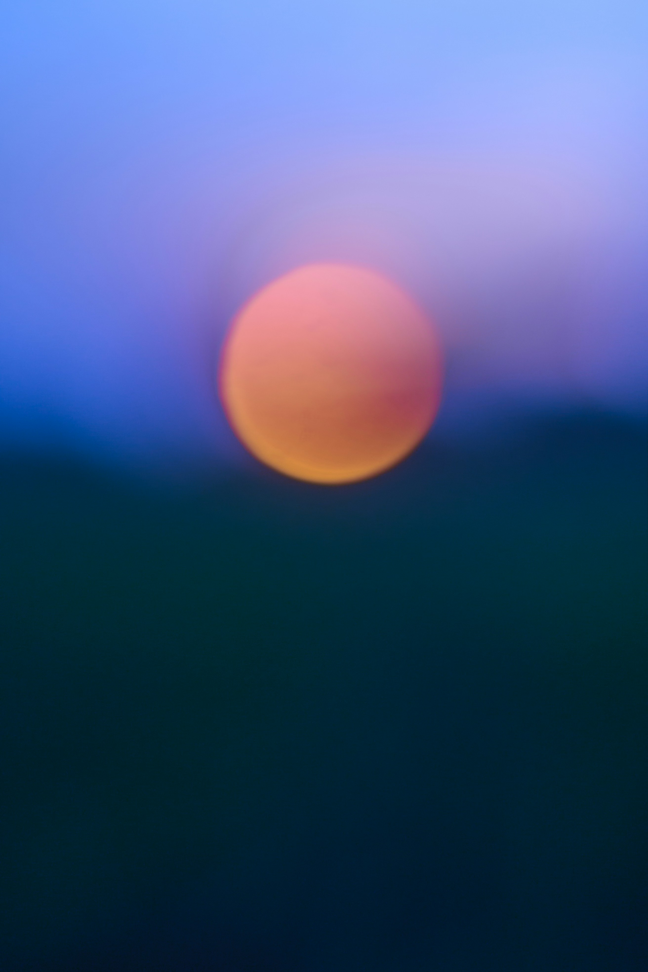 Sunset Blur: A Soft, Abstract Orbs at Dusk