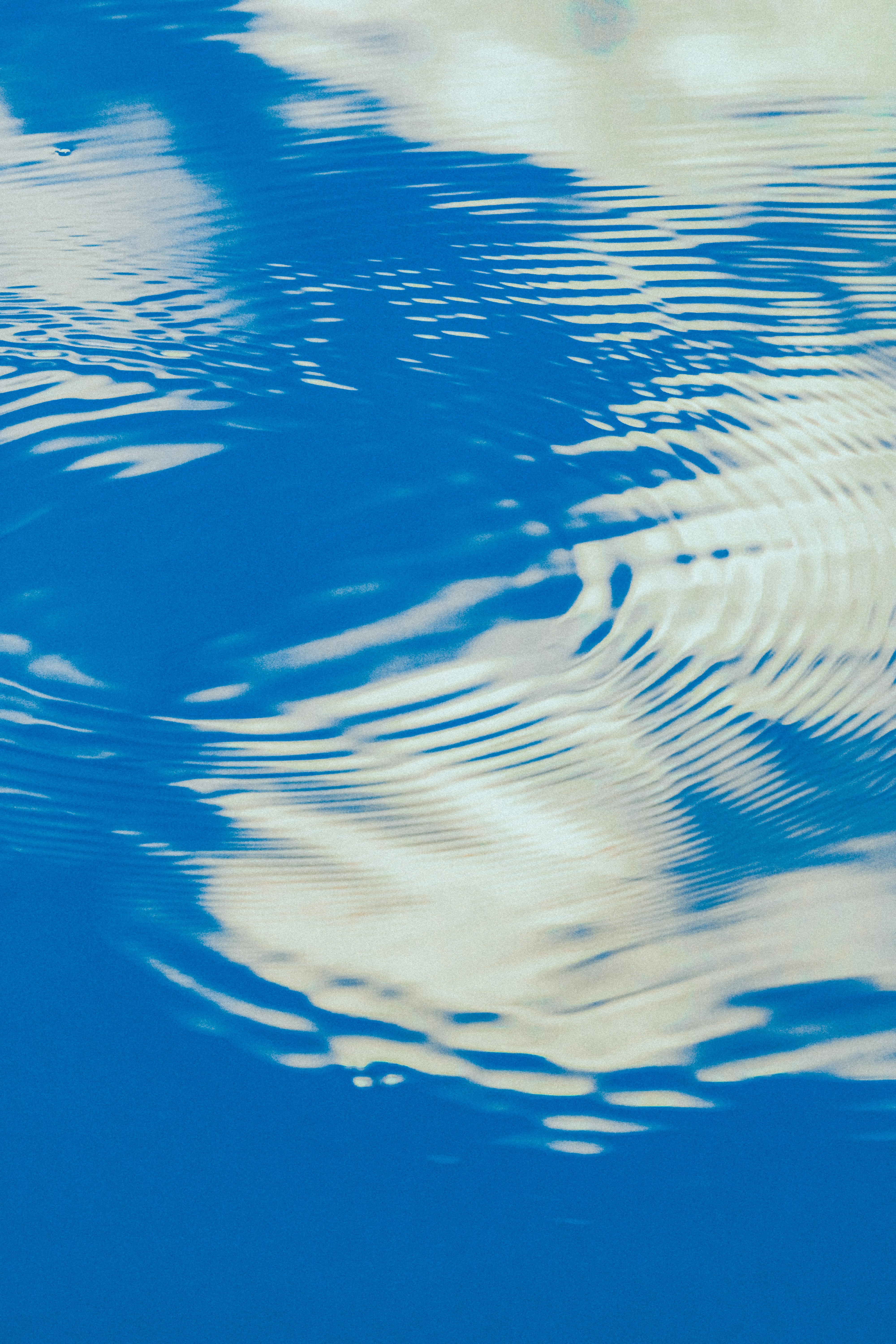 abstract closeup water ripples and colour