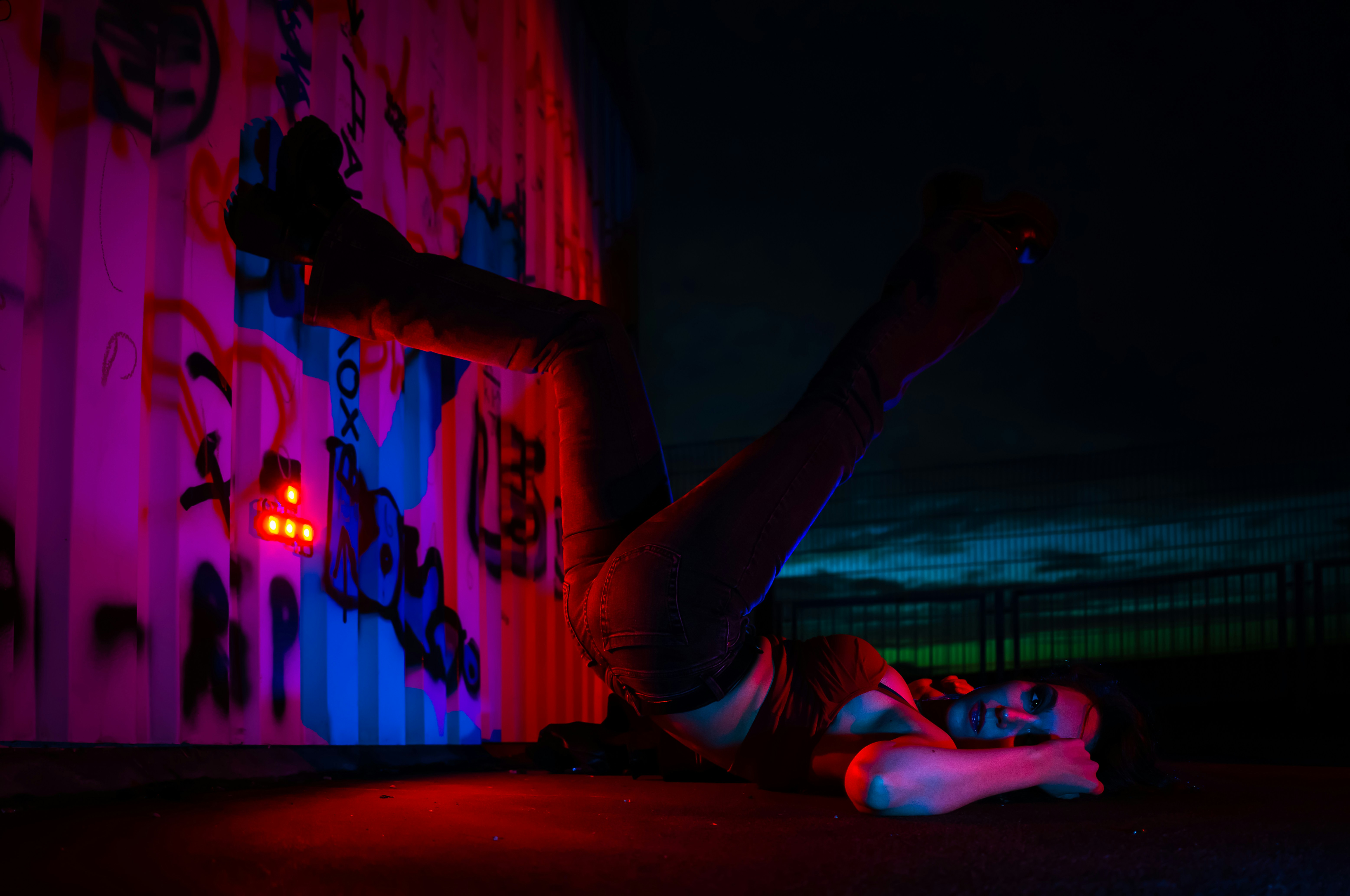 Neon-Lit Fall: A Night Portrait on Graffiti Walls