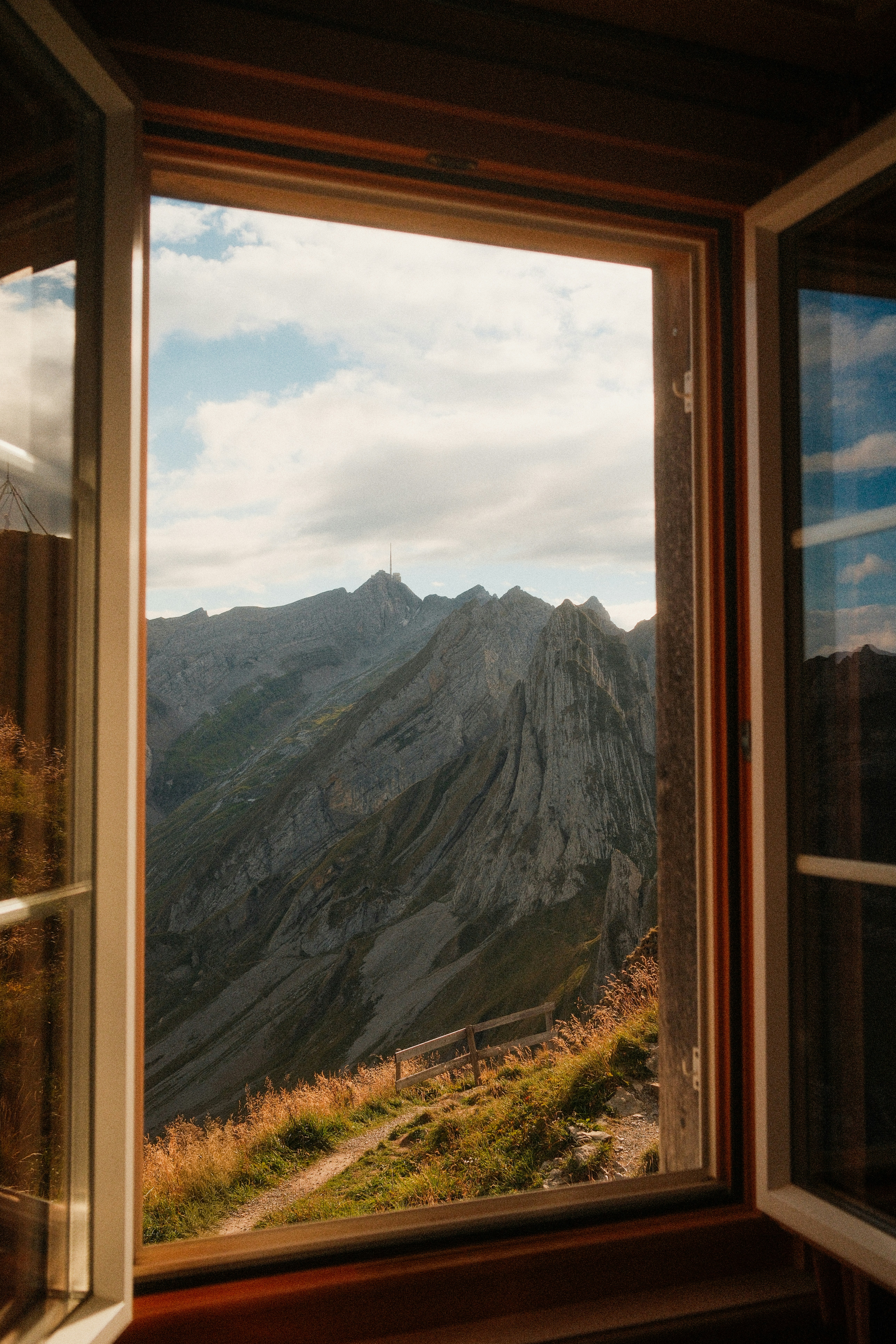Mountain View Through a Framed Doorway at Dusk