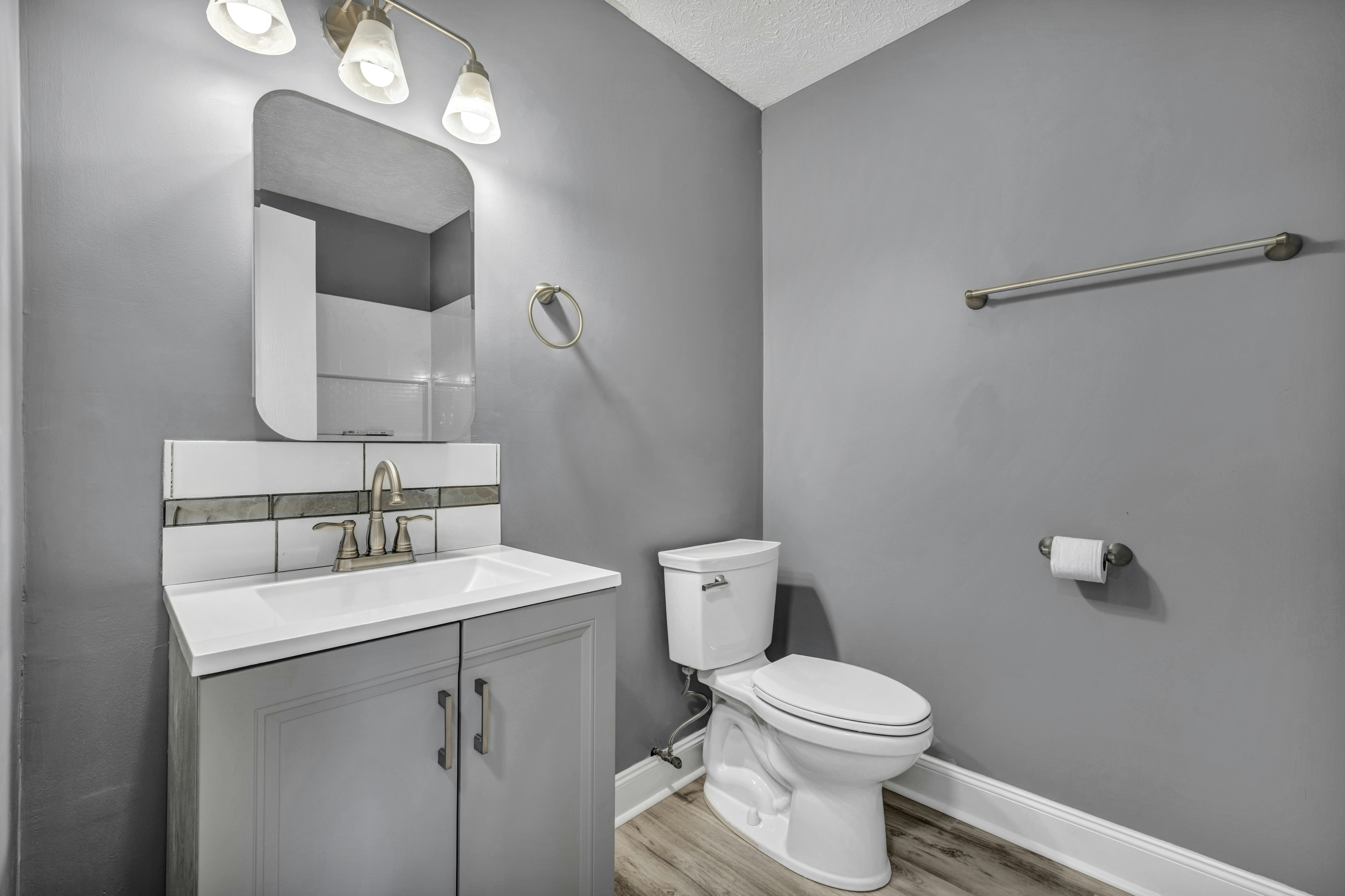 Minimalist Bath Within Soft Gray Walls