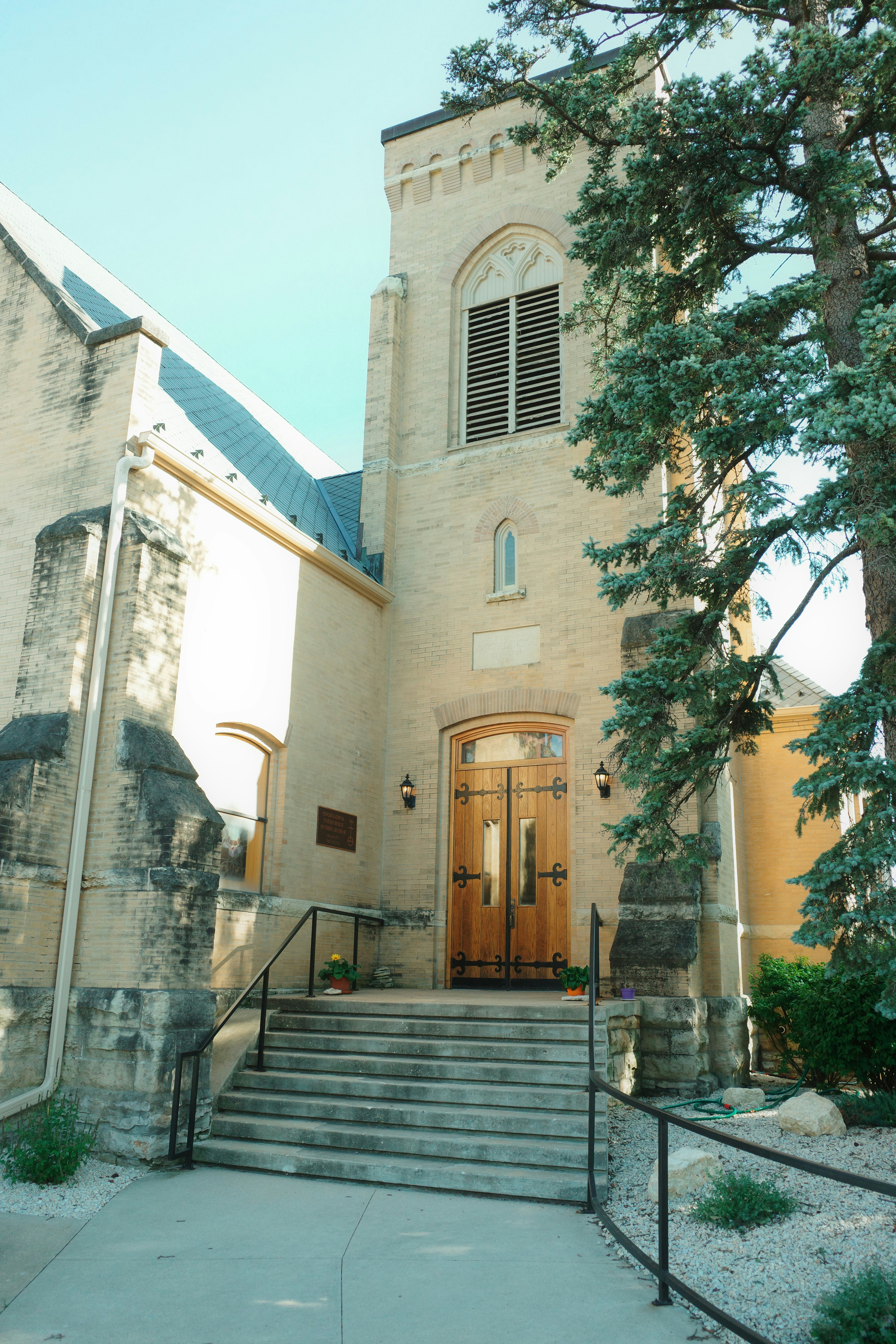 Staircase to the Light: A Church Facade in Sunlit Brick