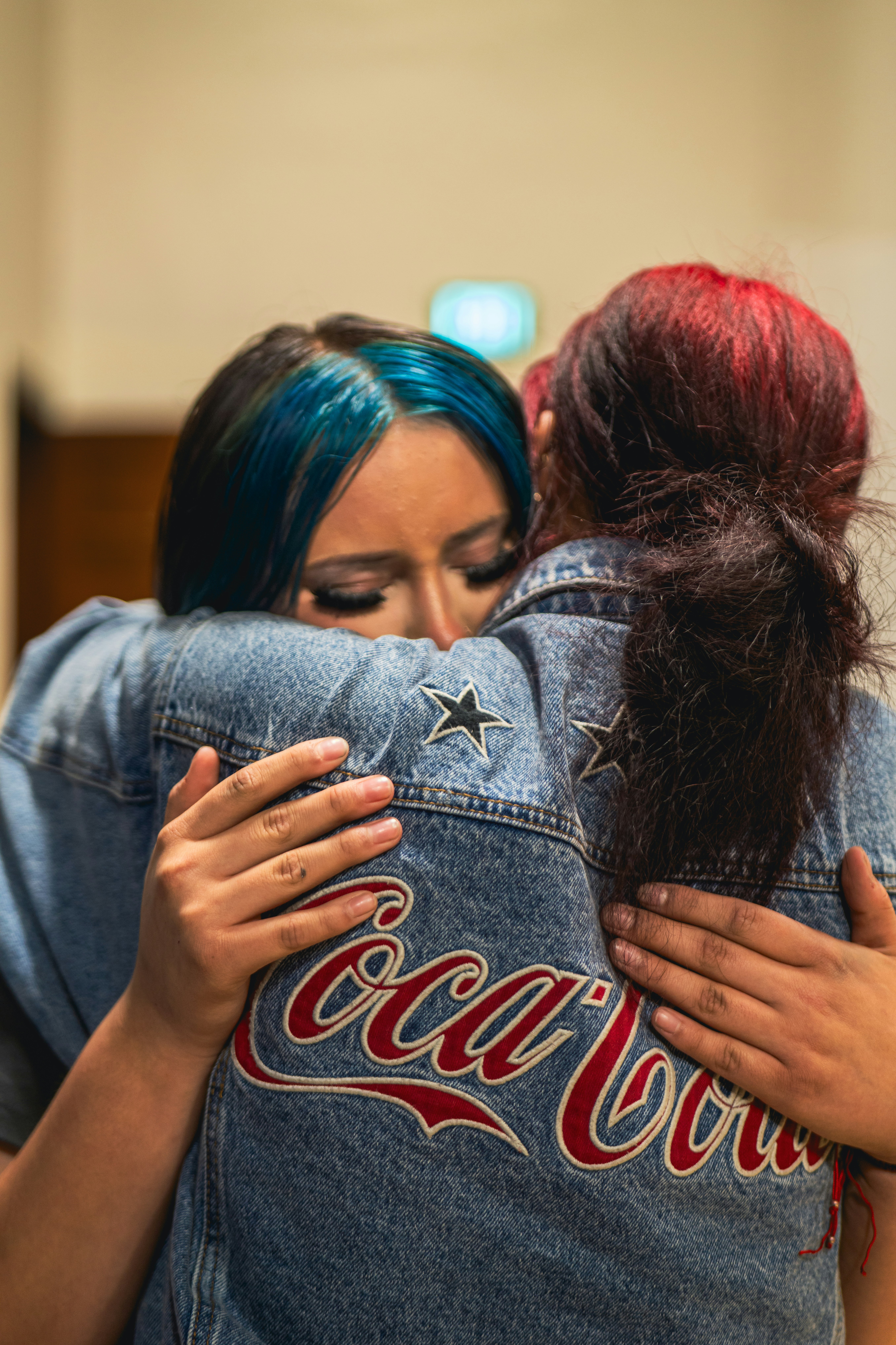 Two Friends in a Denim Embrace: Coca-Cola Denim Duo