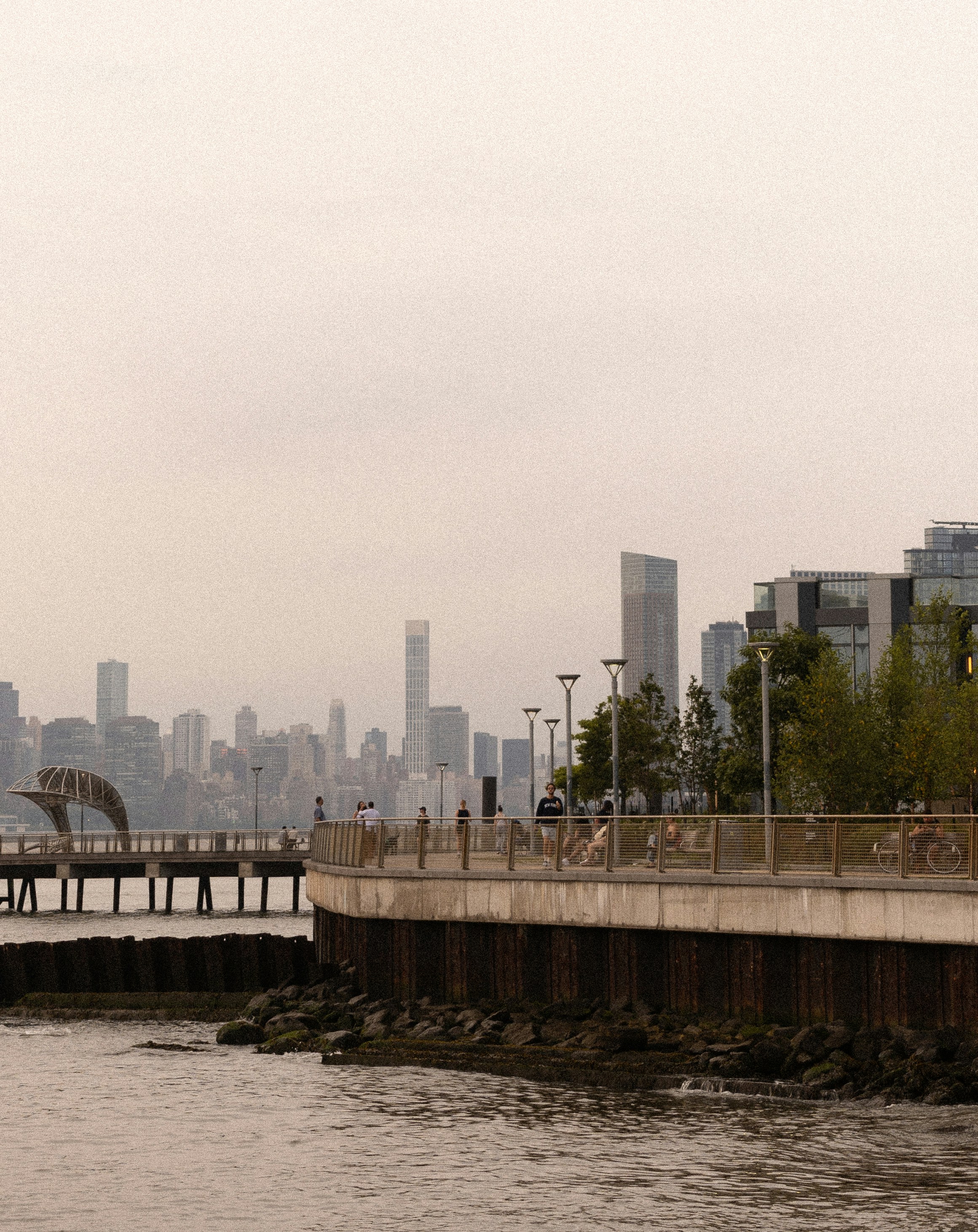 City Waterfront Promenade Under a Soft Evening Glow