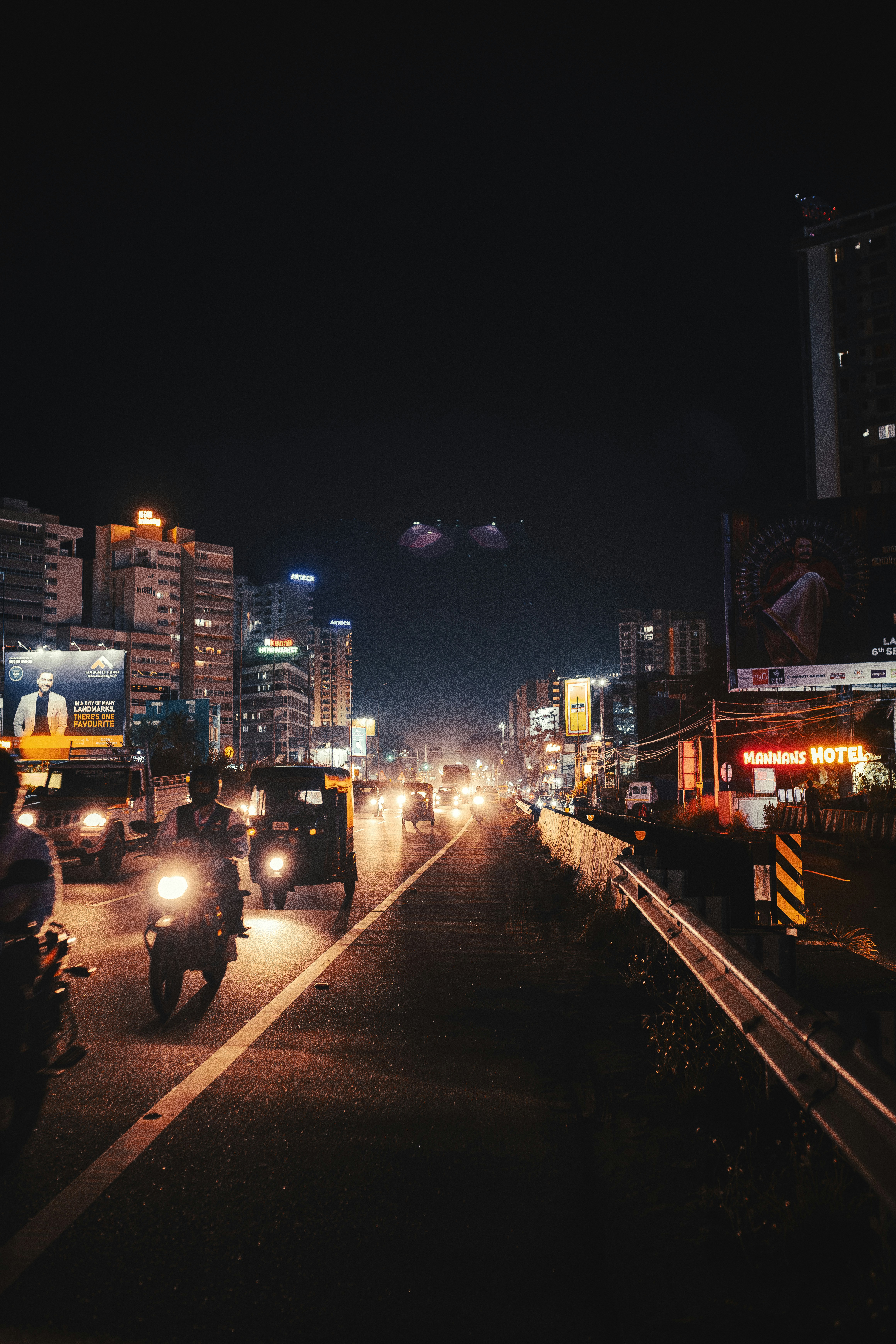 City Pulse: Night Traffic Converging Toward the Horizon