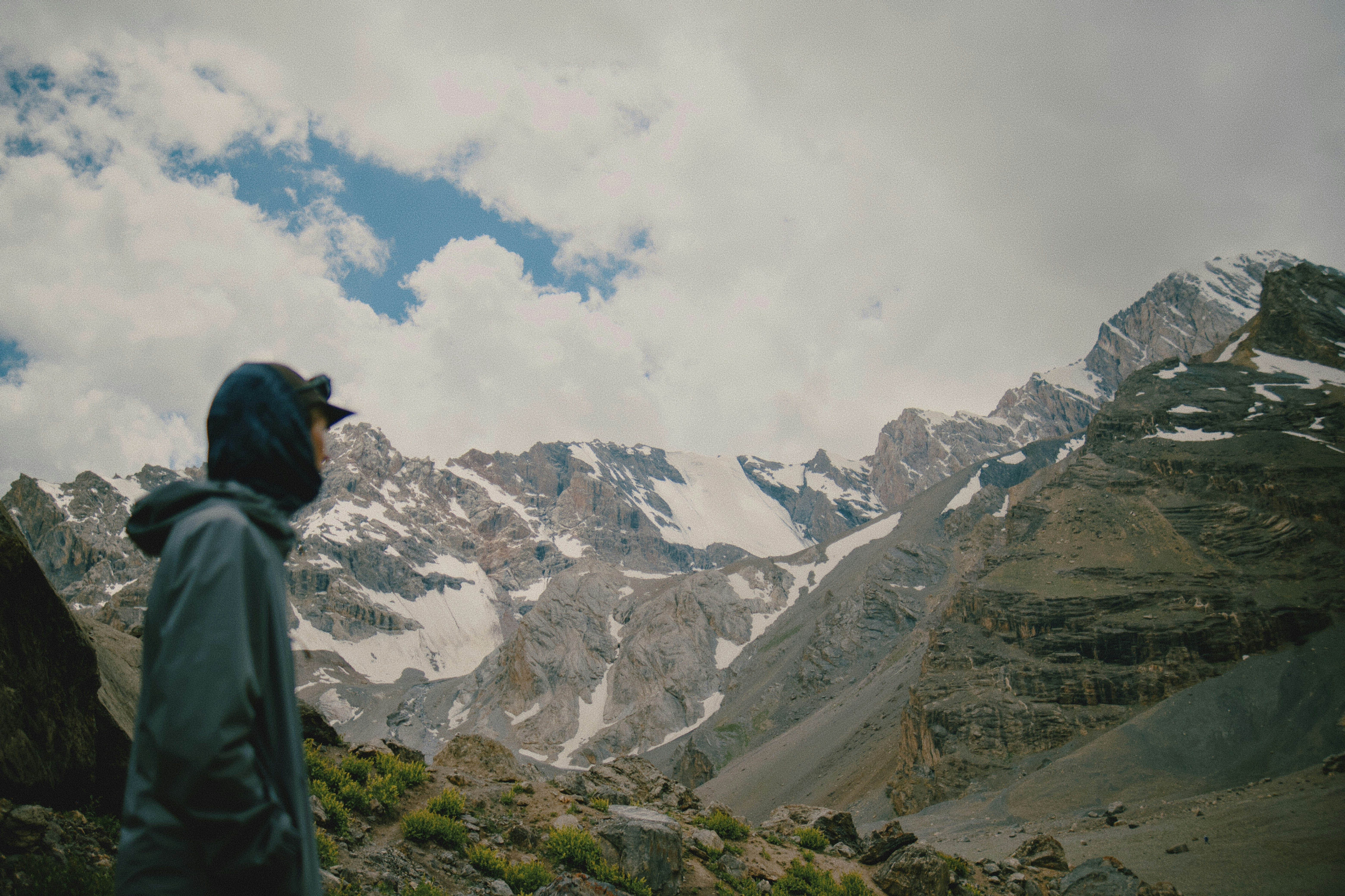 Wanderer Beneath Snowbound Peaks