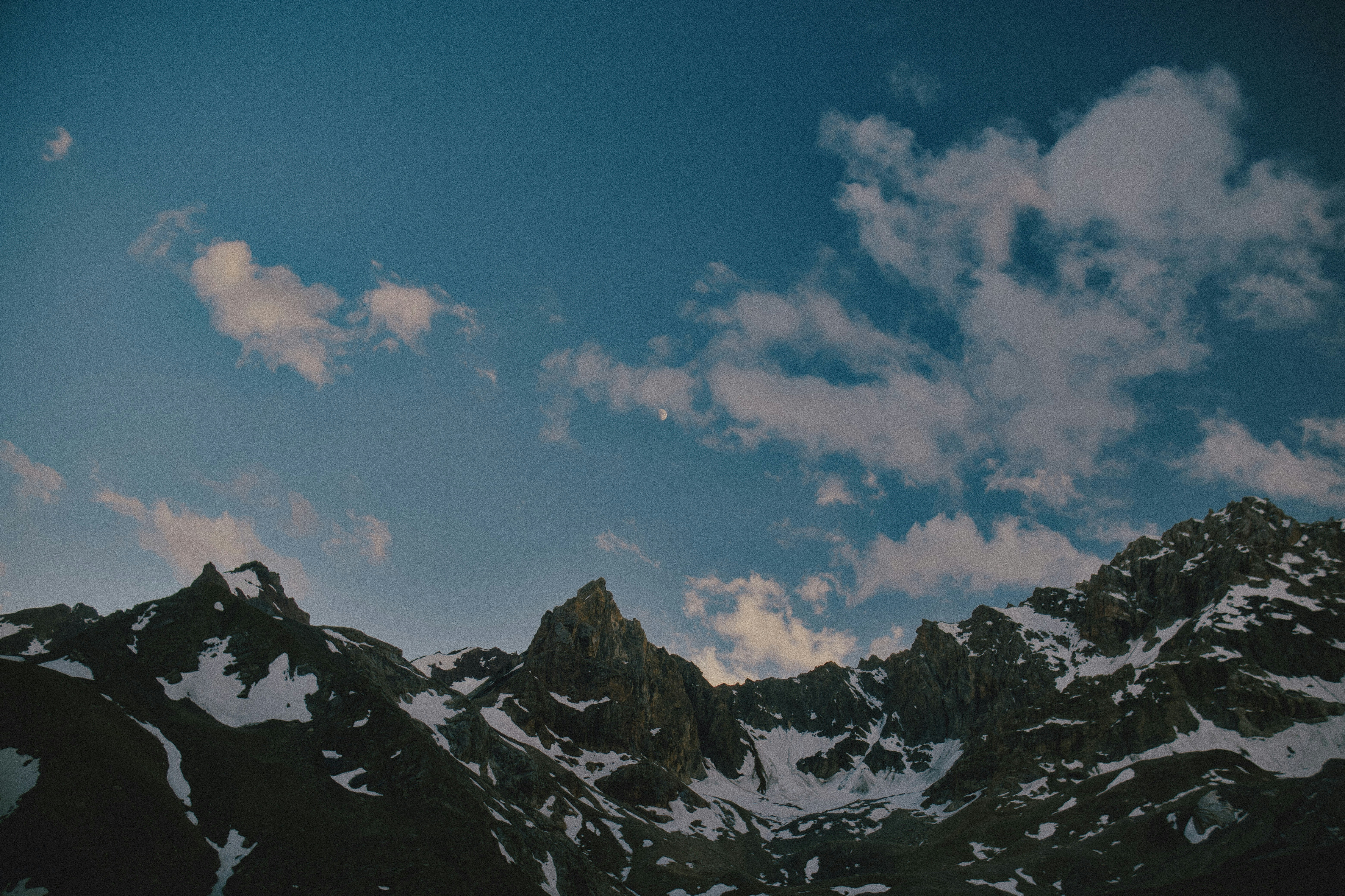 Snow-kissed ridge under a crisp alpine sky