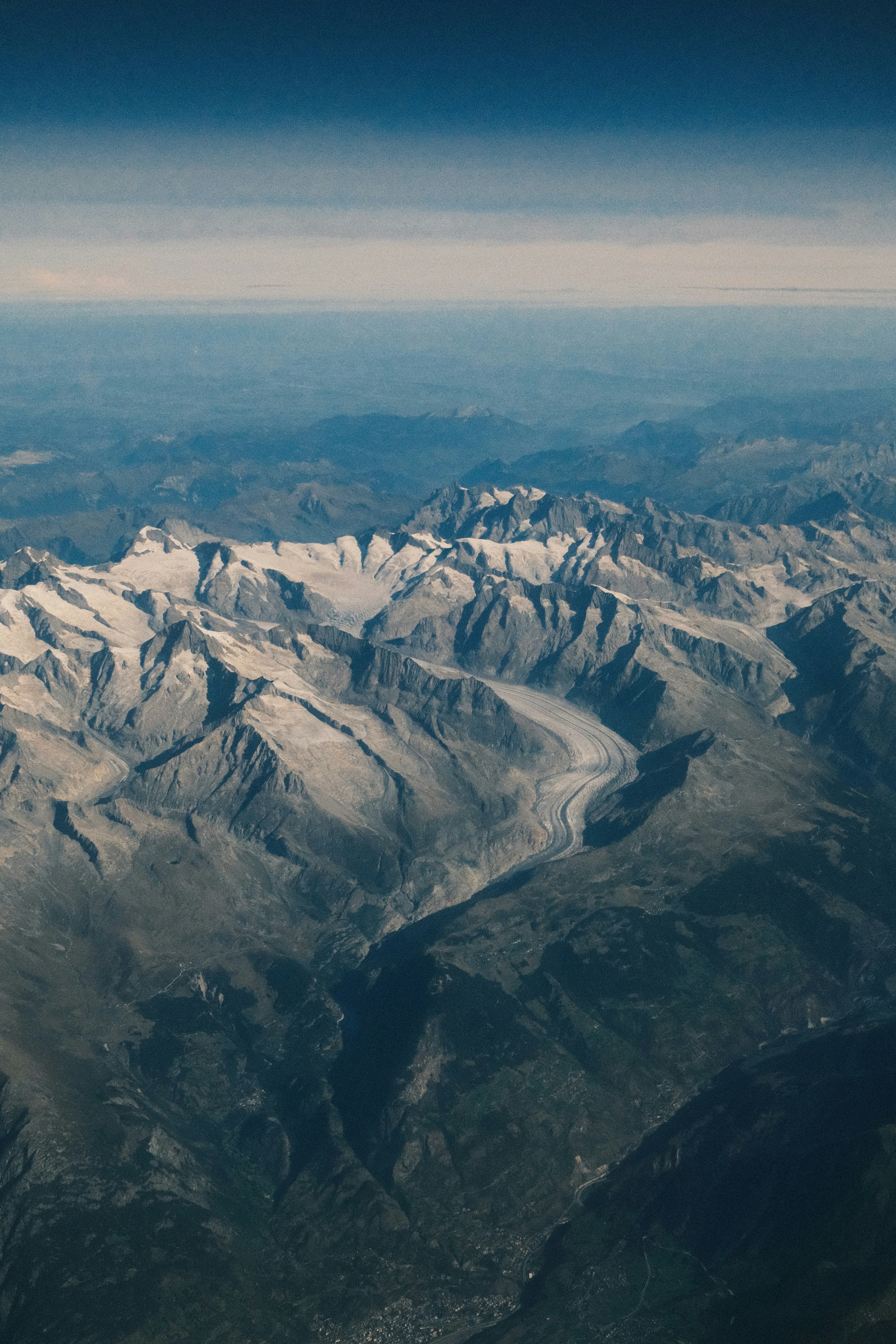 Snow-Crowned Fjords from a High-Altitude Corridor