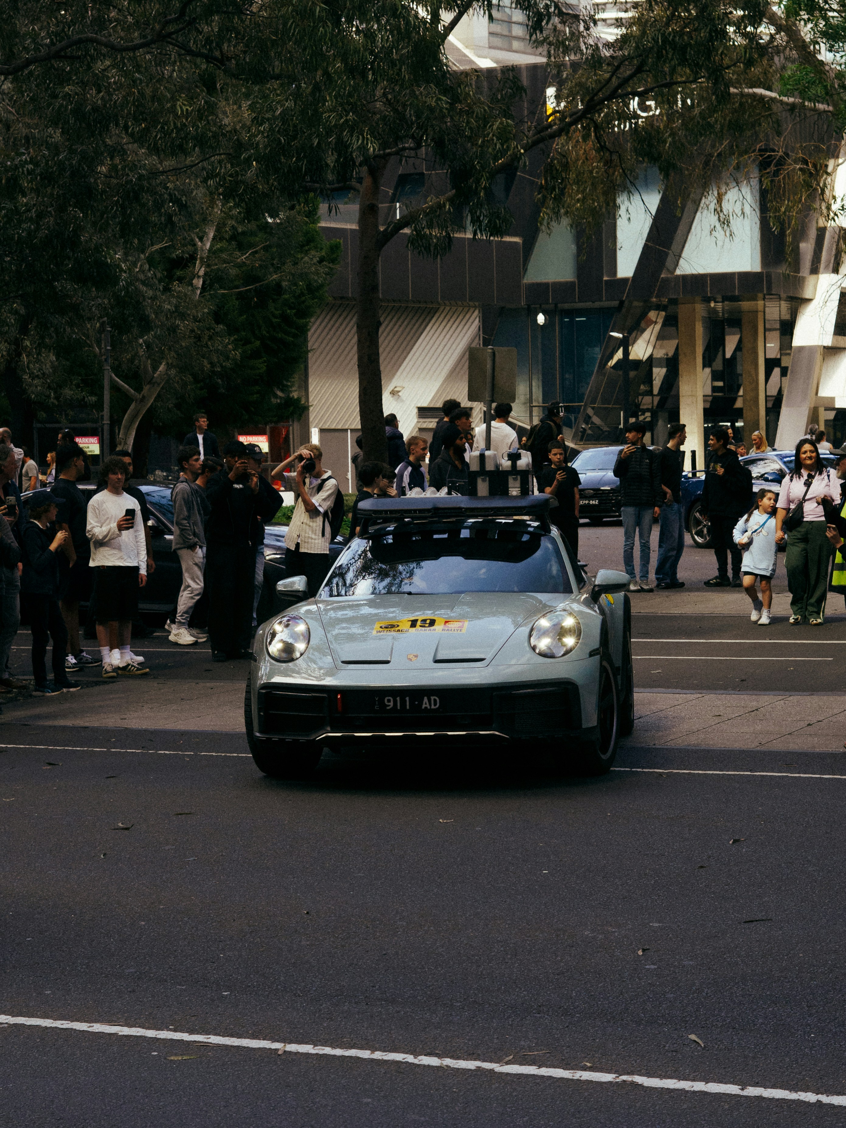 Race-Ready in the City: A Porsche Stirs the Street Crowd
