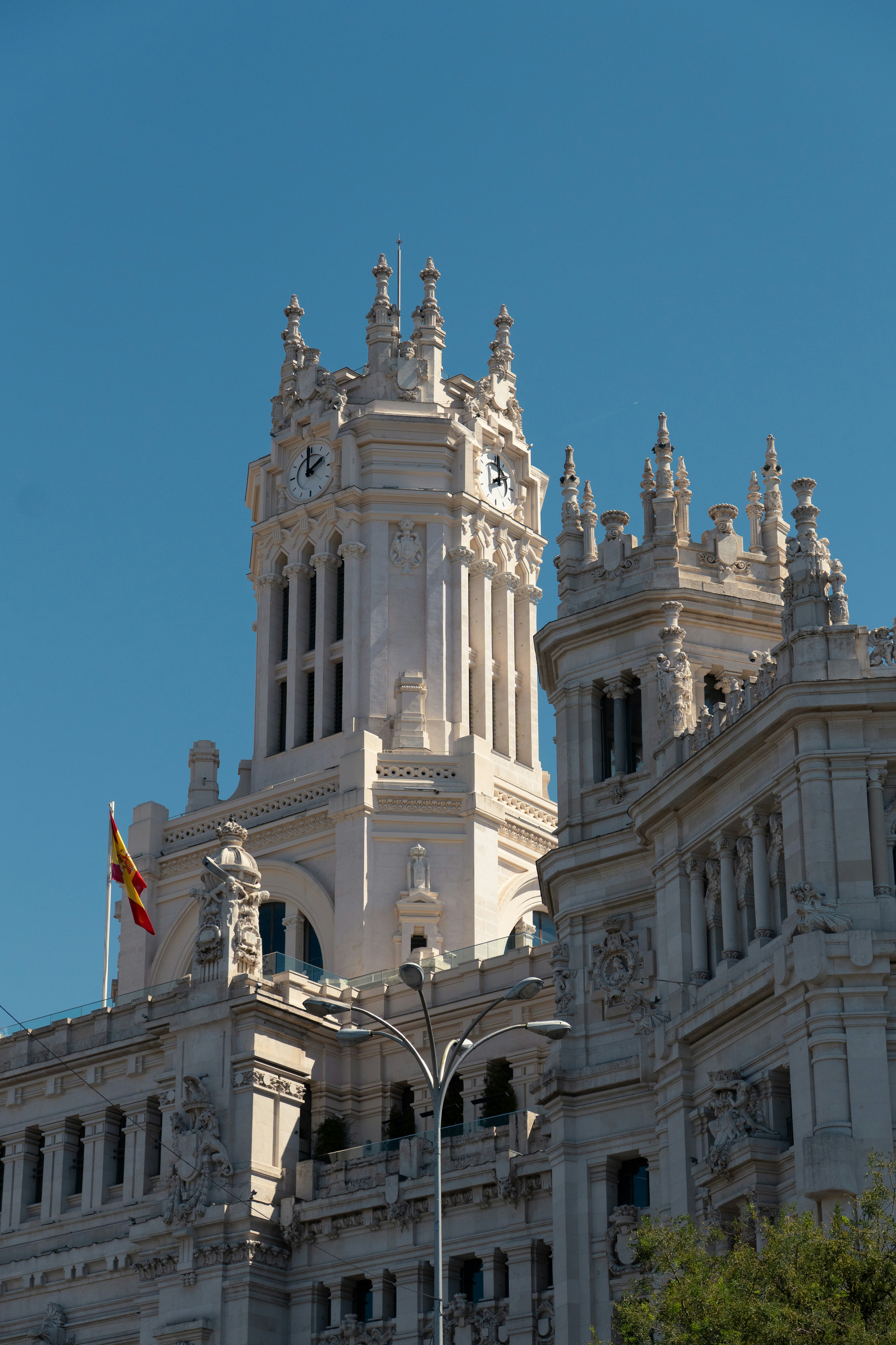 Ornate Clocktower Spires Crown a Monument Against a Clear Sky
