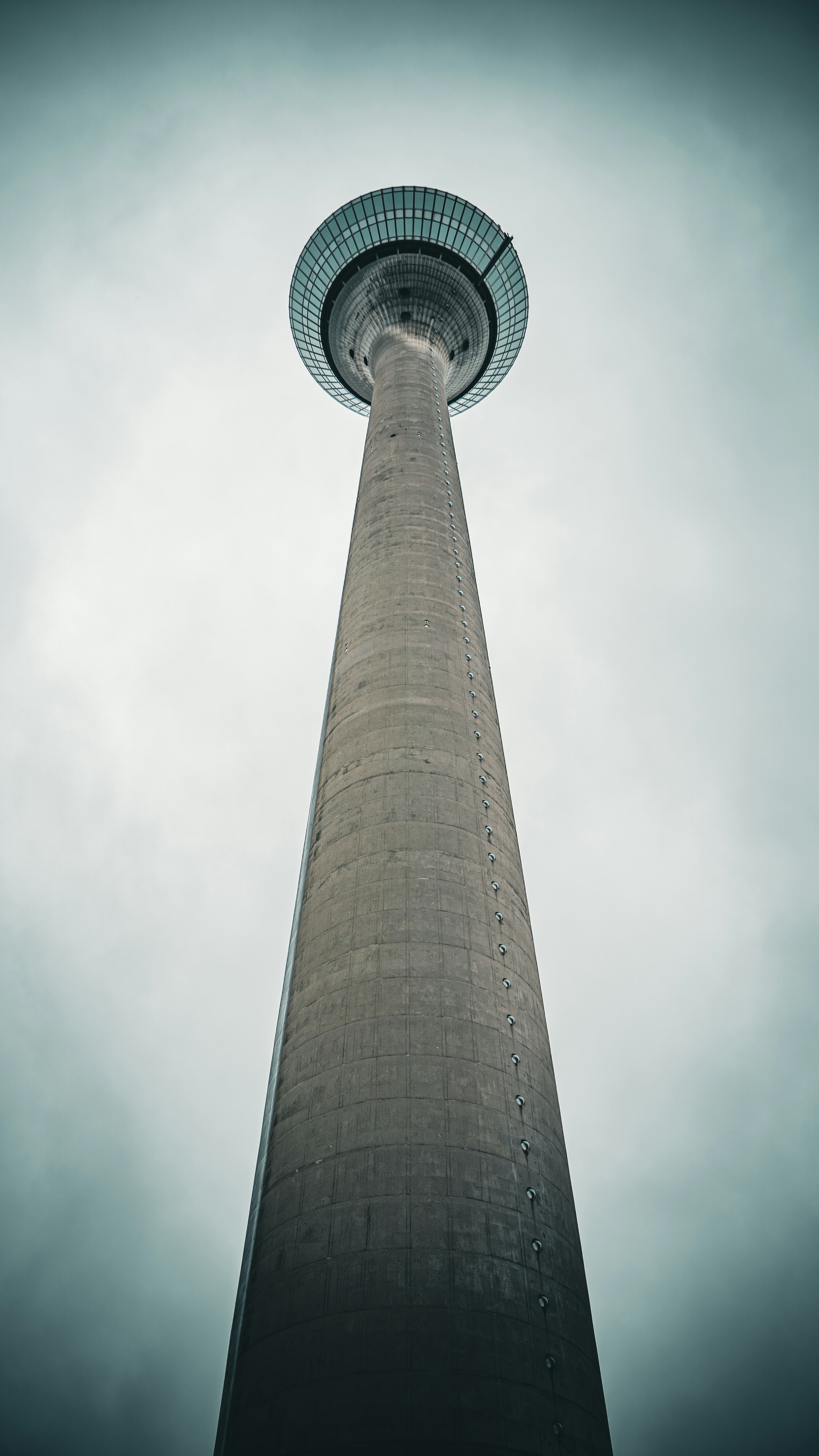 The Spire Alone: Upward Gaze at a Tower's Quiet Conquest