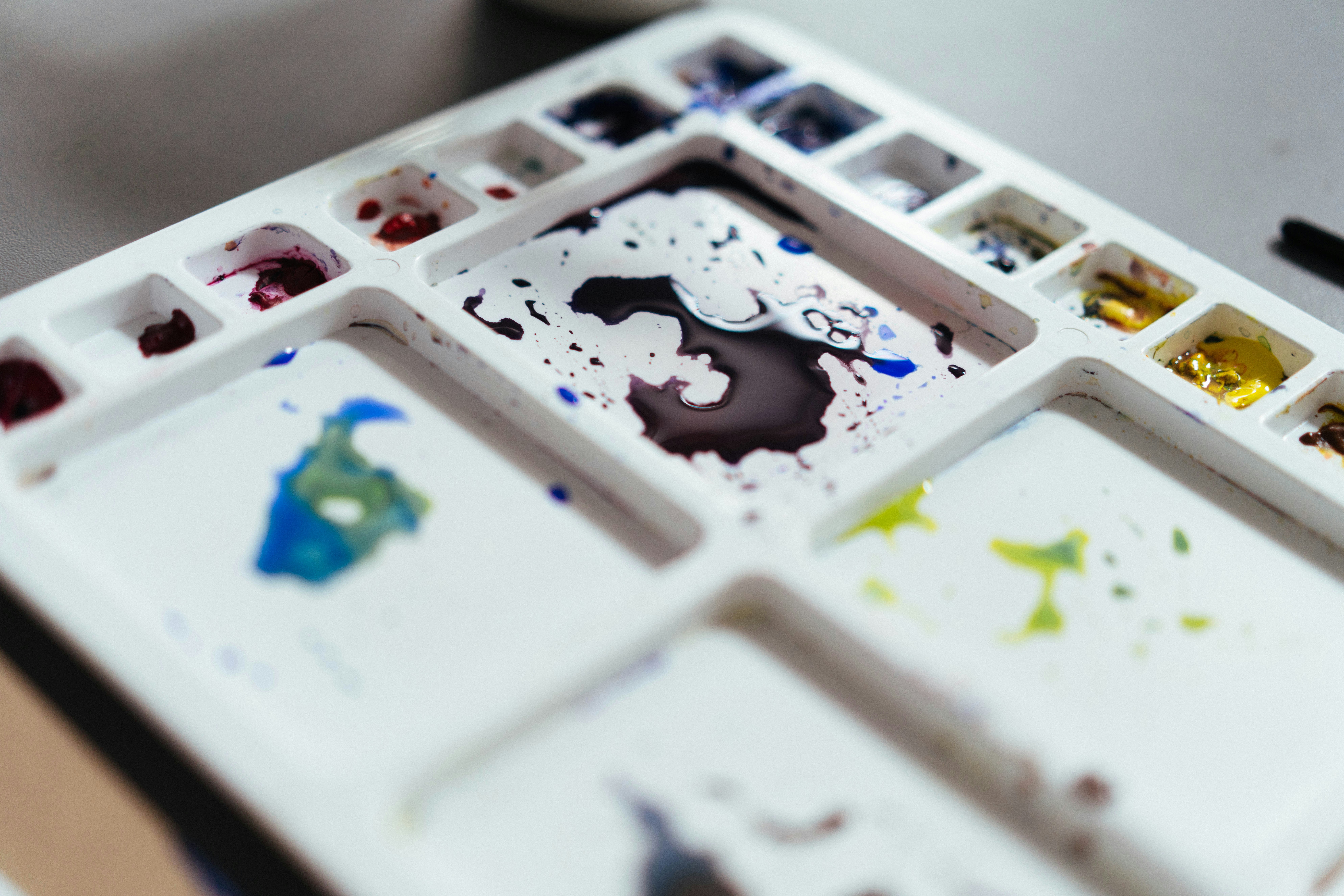 Palette of Quiet Hues: A Painter’s Desk in Focus