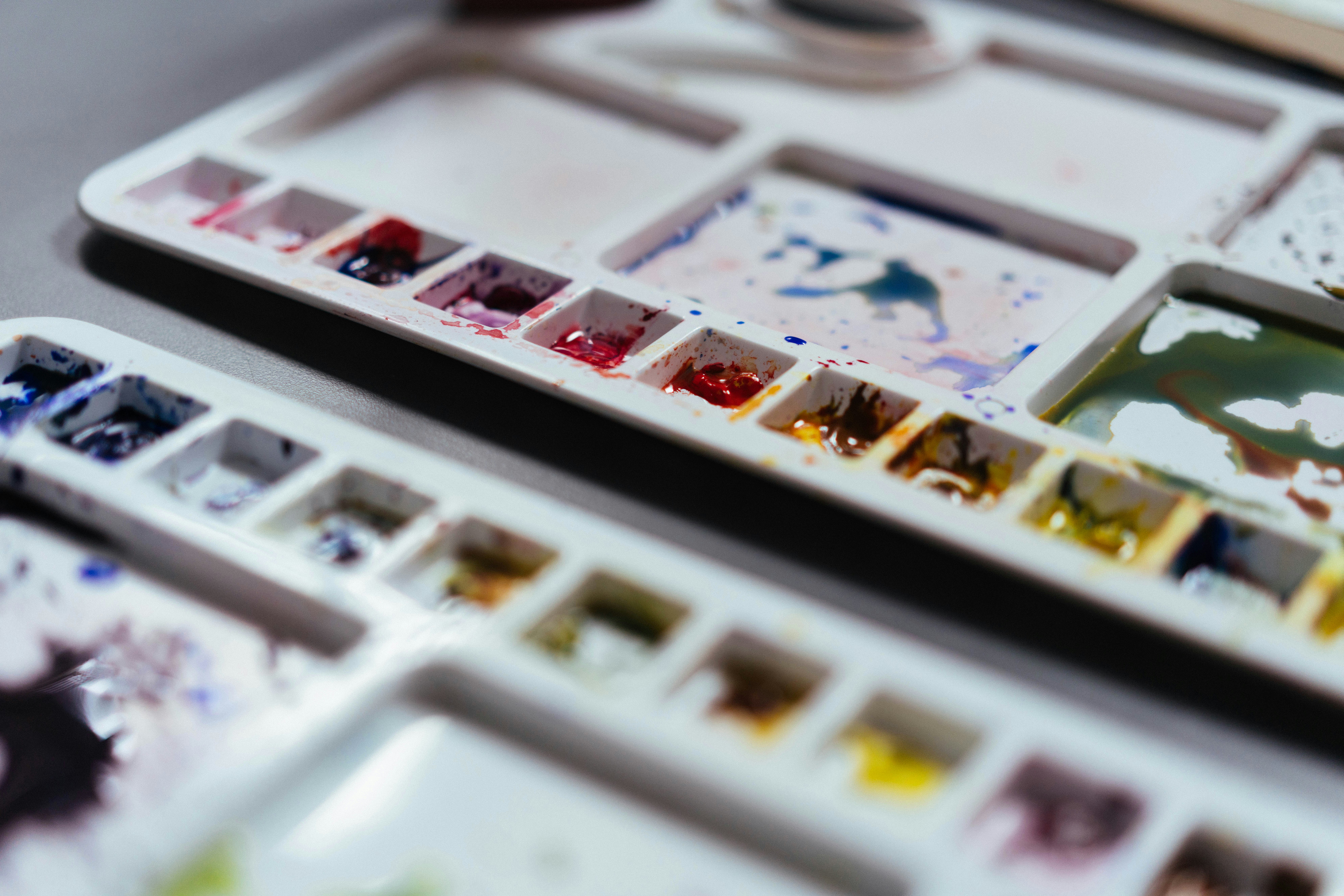 Palette Pages: A Close-Up of Color Swatches and Paint