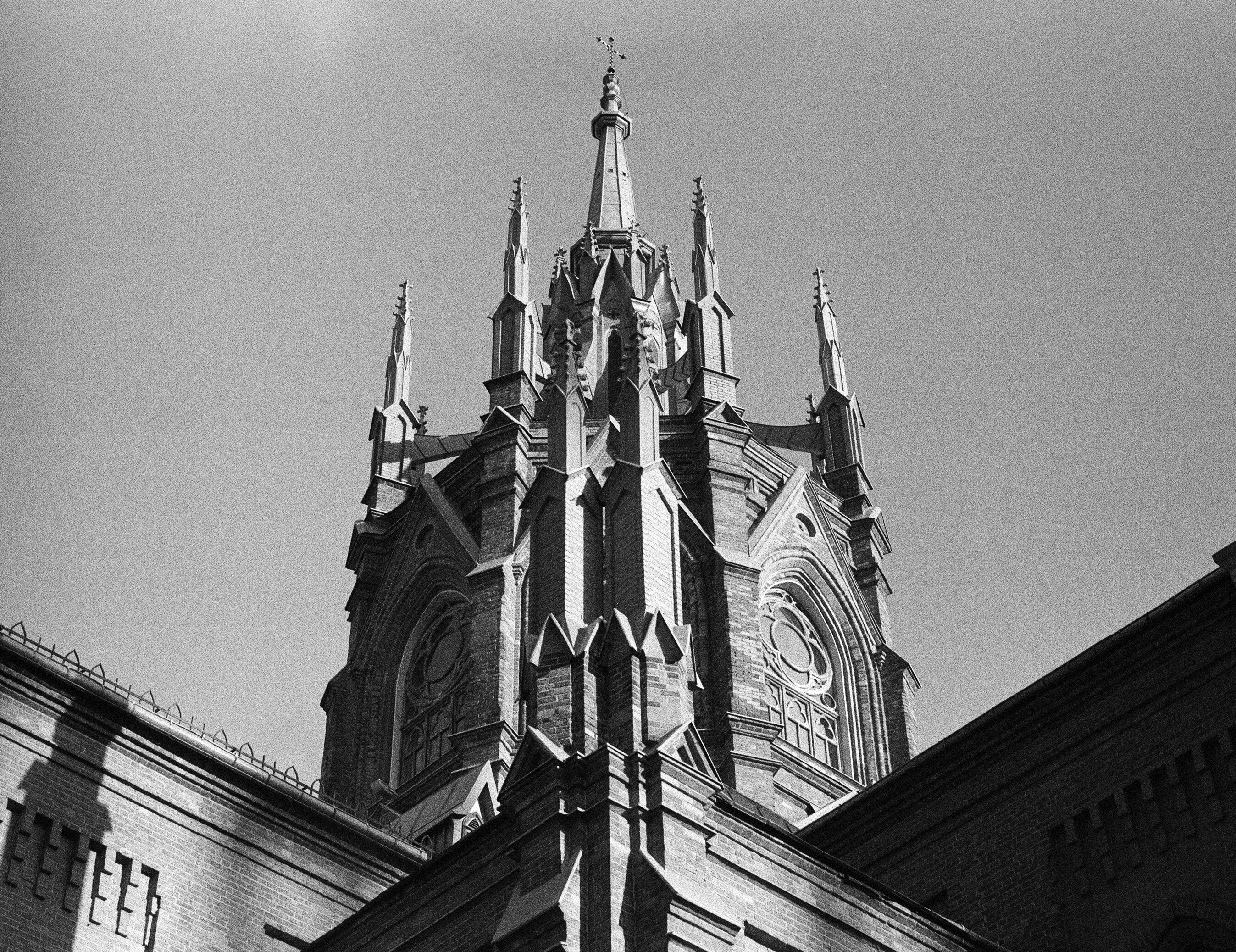 Gothic Spire Rising: A Stone Crown Against the Sky