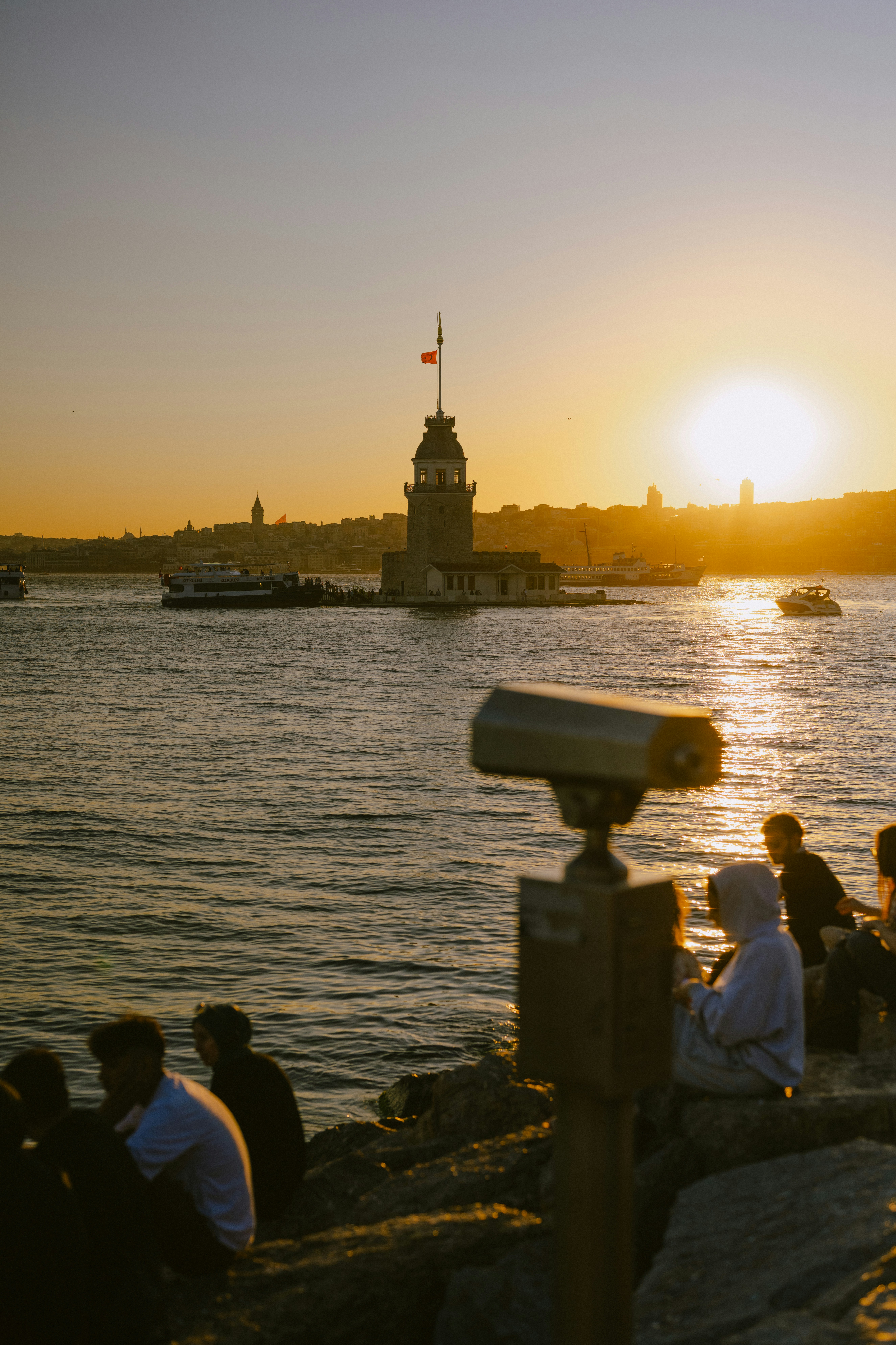 Sunlit tower at golden hour over the Bosphorus