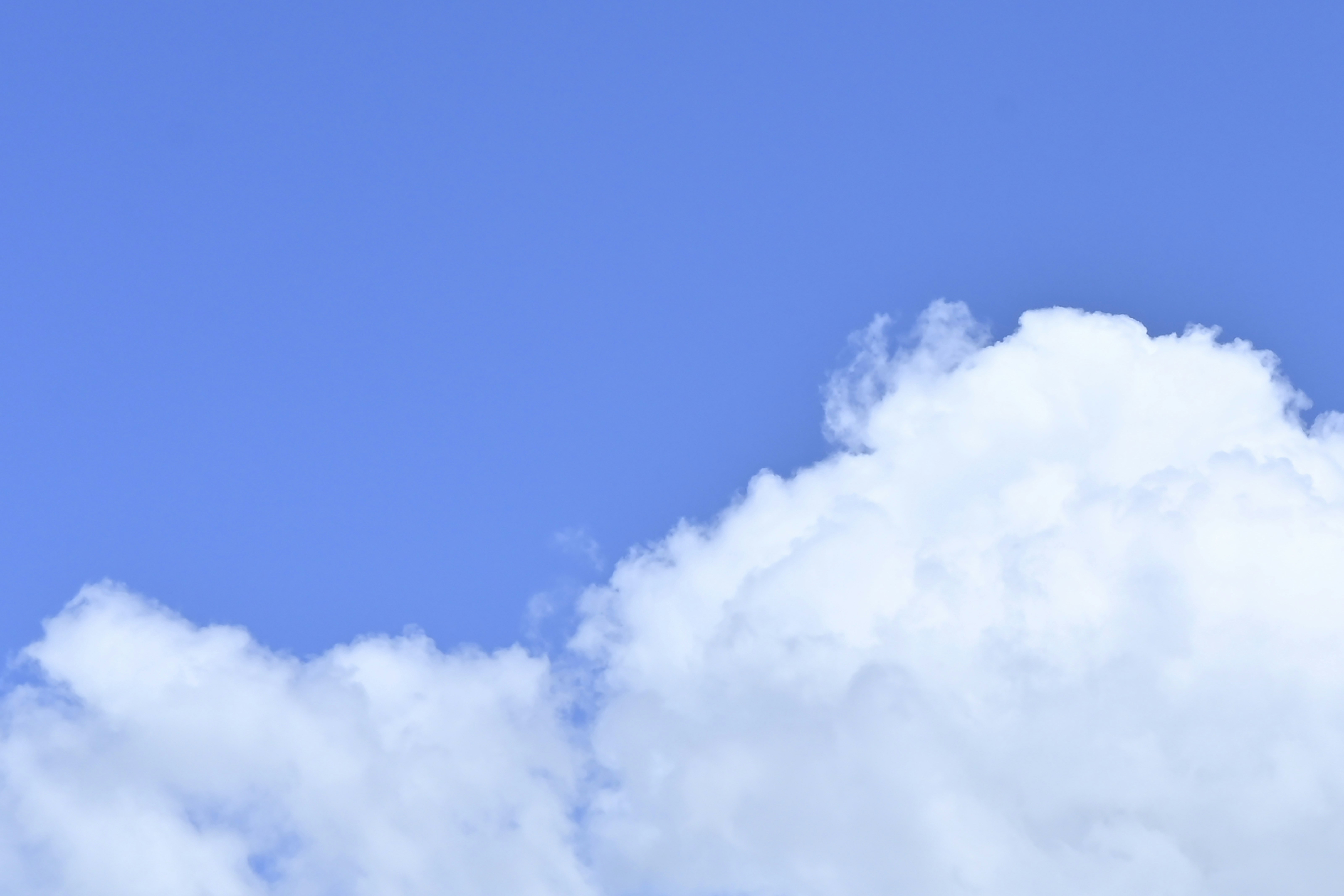 Azure Summit: A Corner of Sky with Billowing Cloud
