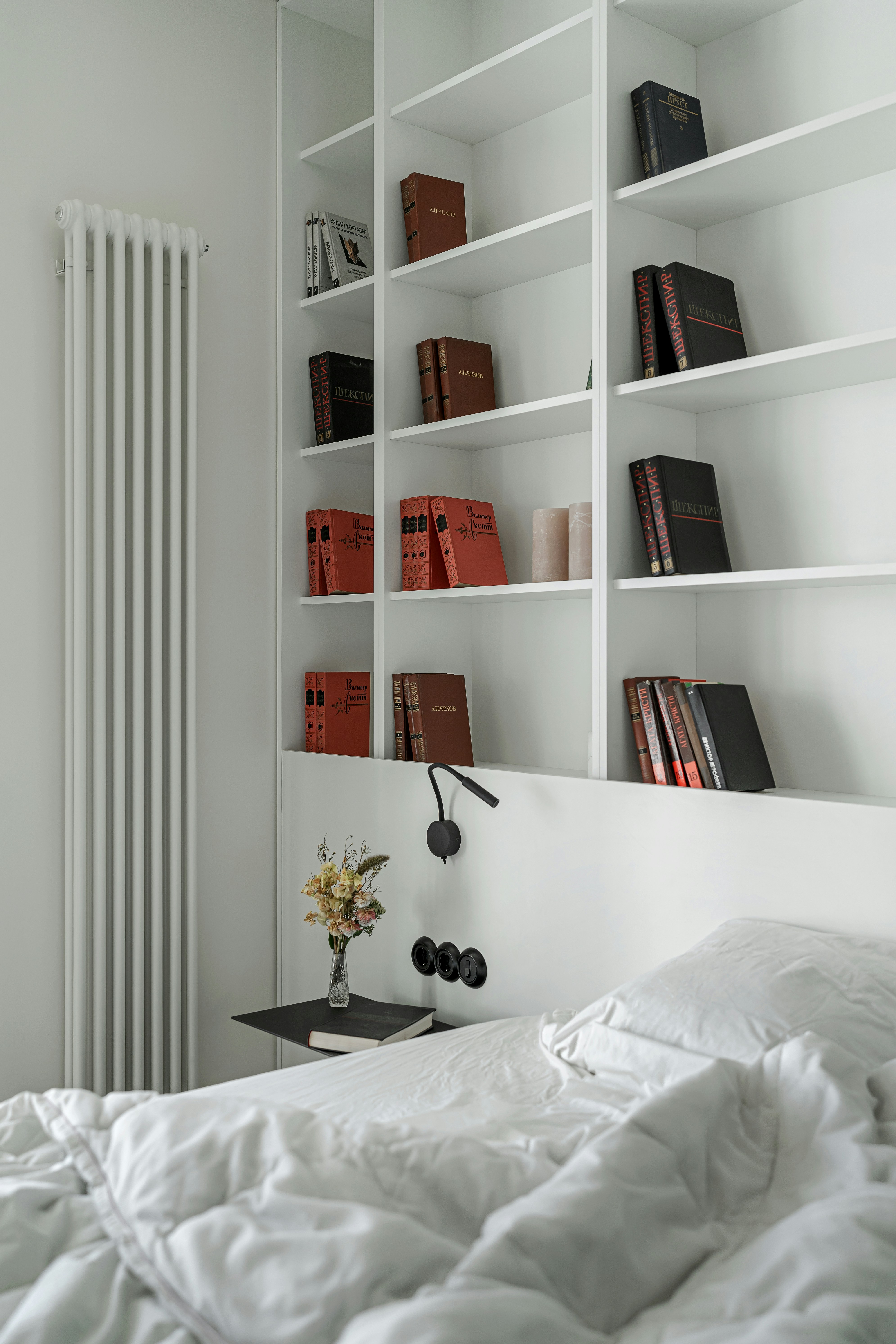 Minimalist Library Nook: White Shelves, Silent Bedside Nightlight