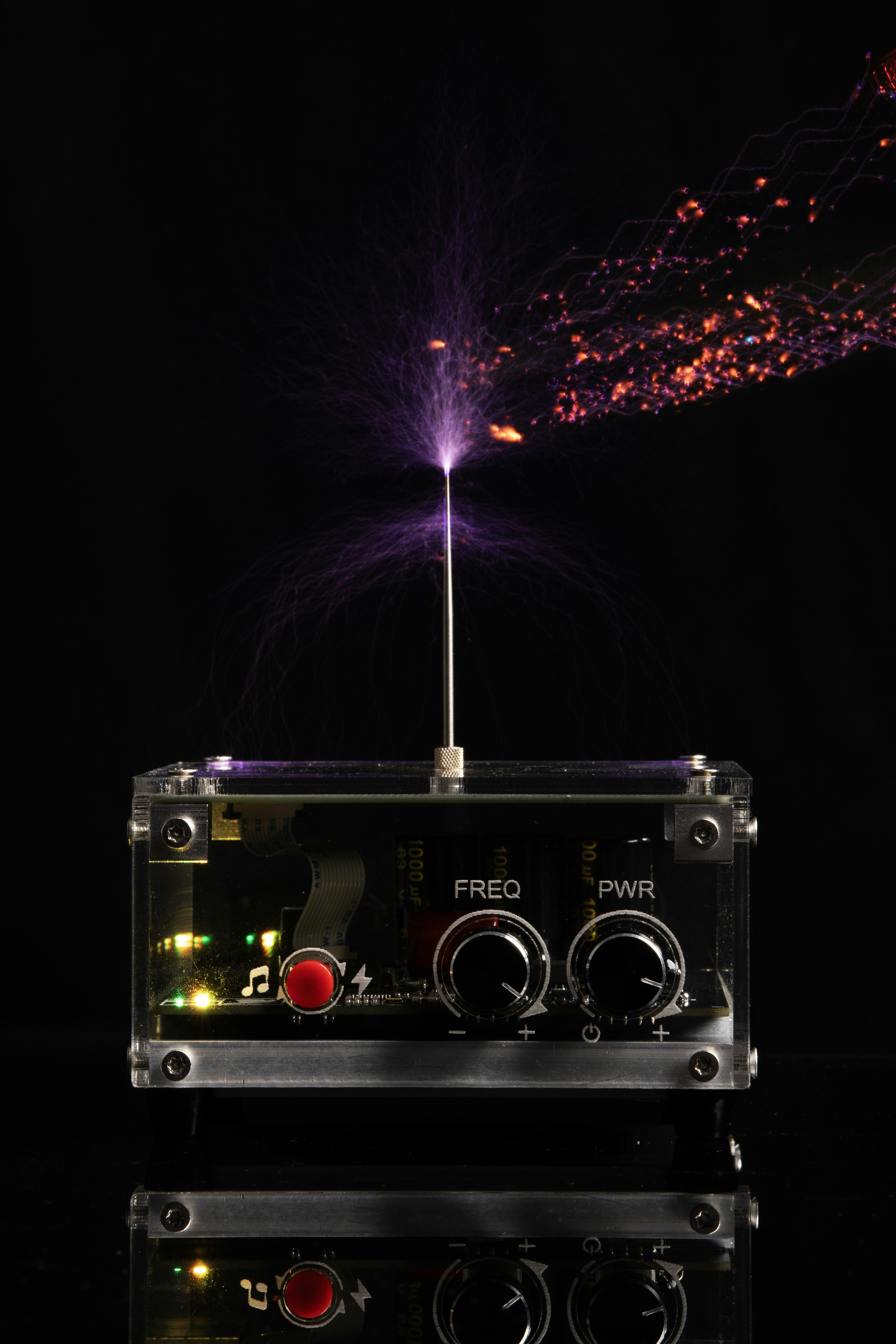 Electrified Microsystem: A Clear Box and its Spark