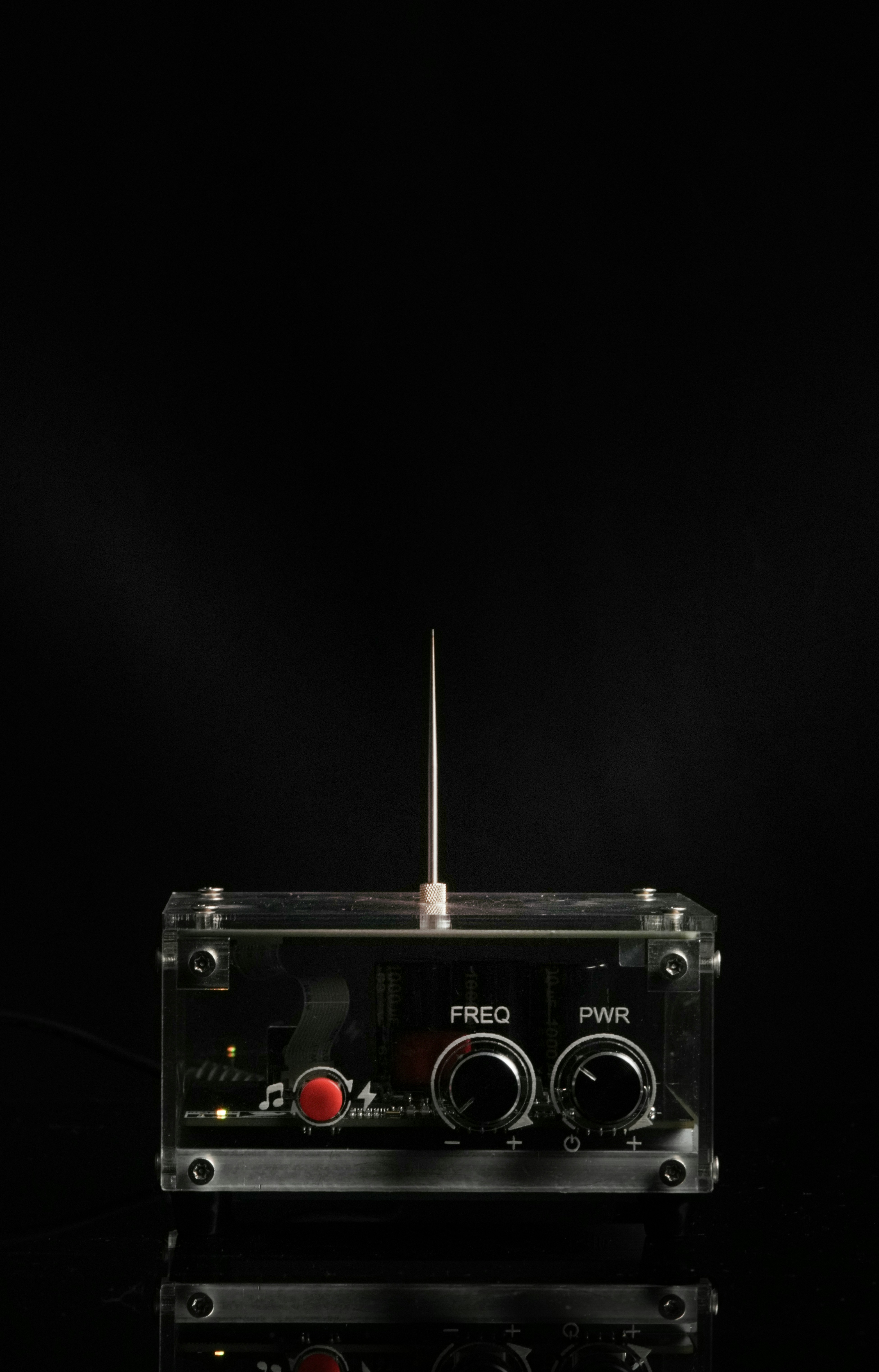 Clear Signal: A Minimalist Radio Receiver Emerges from Darkness