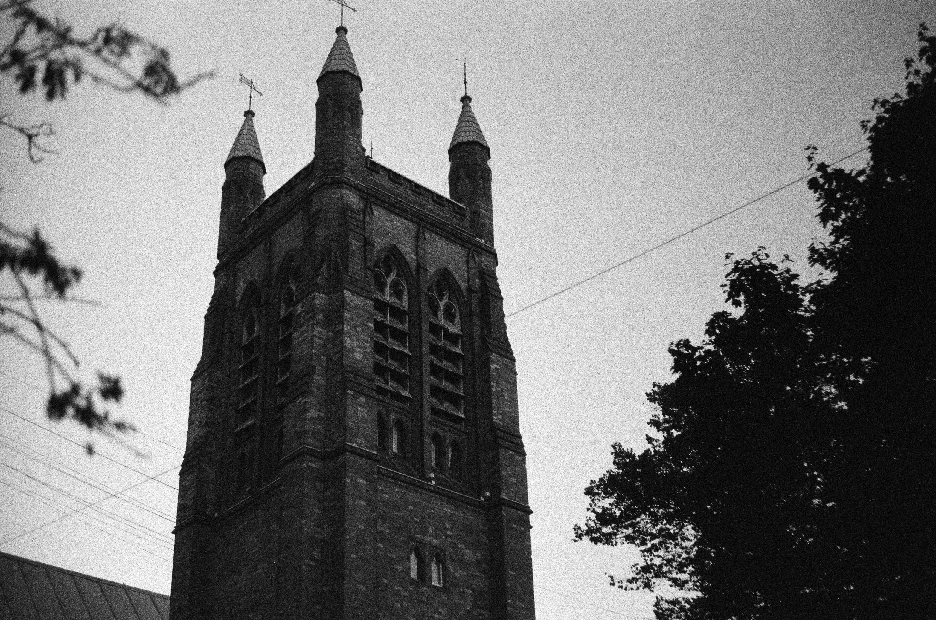 Towering Gothic Beacon under Silent Black-and-White Sky