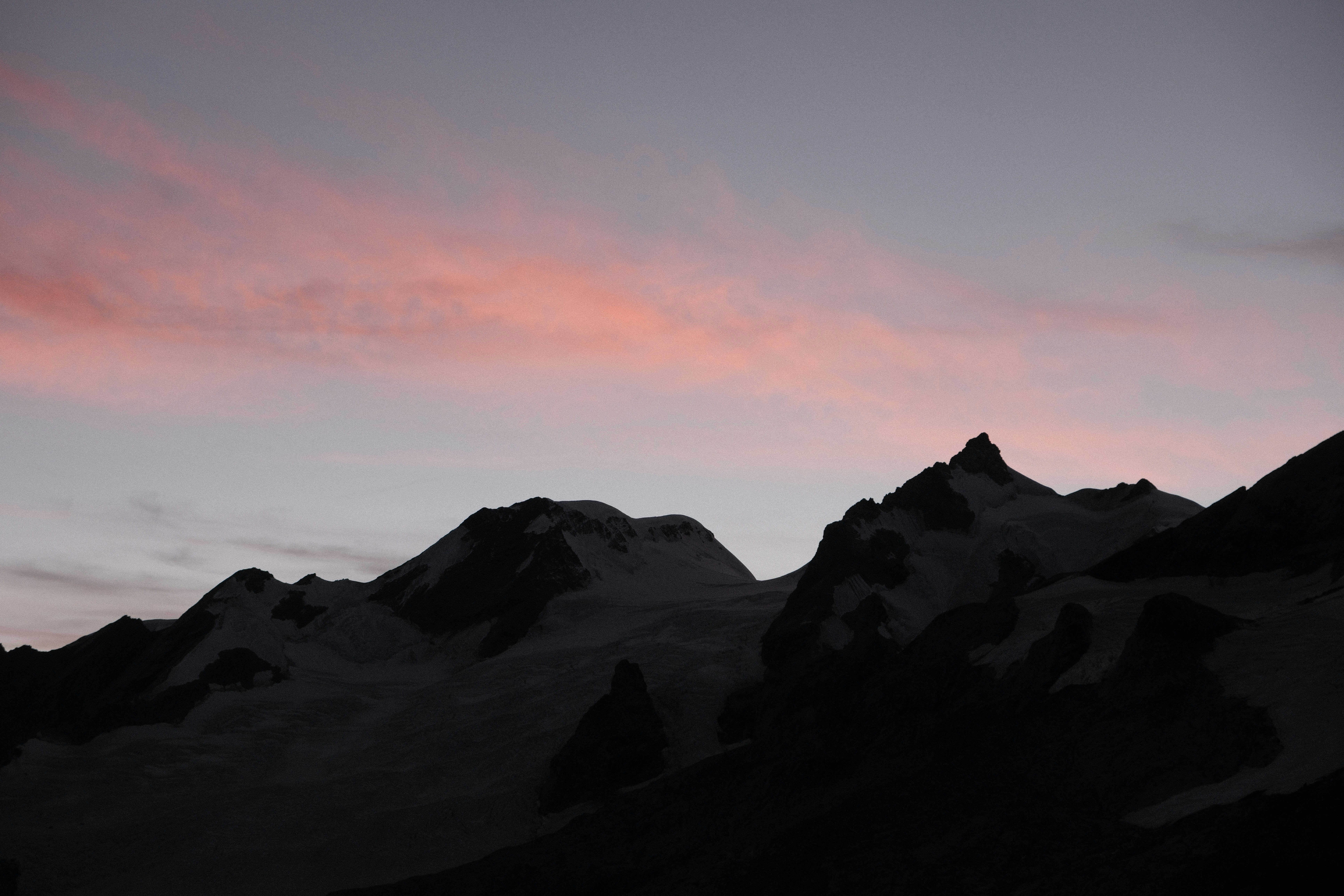 Dawn’s Rim: A Silent Glacier Crowned in Coral