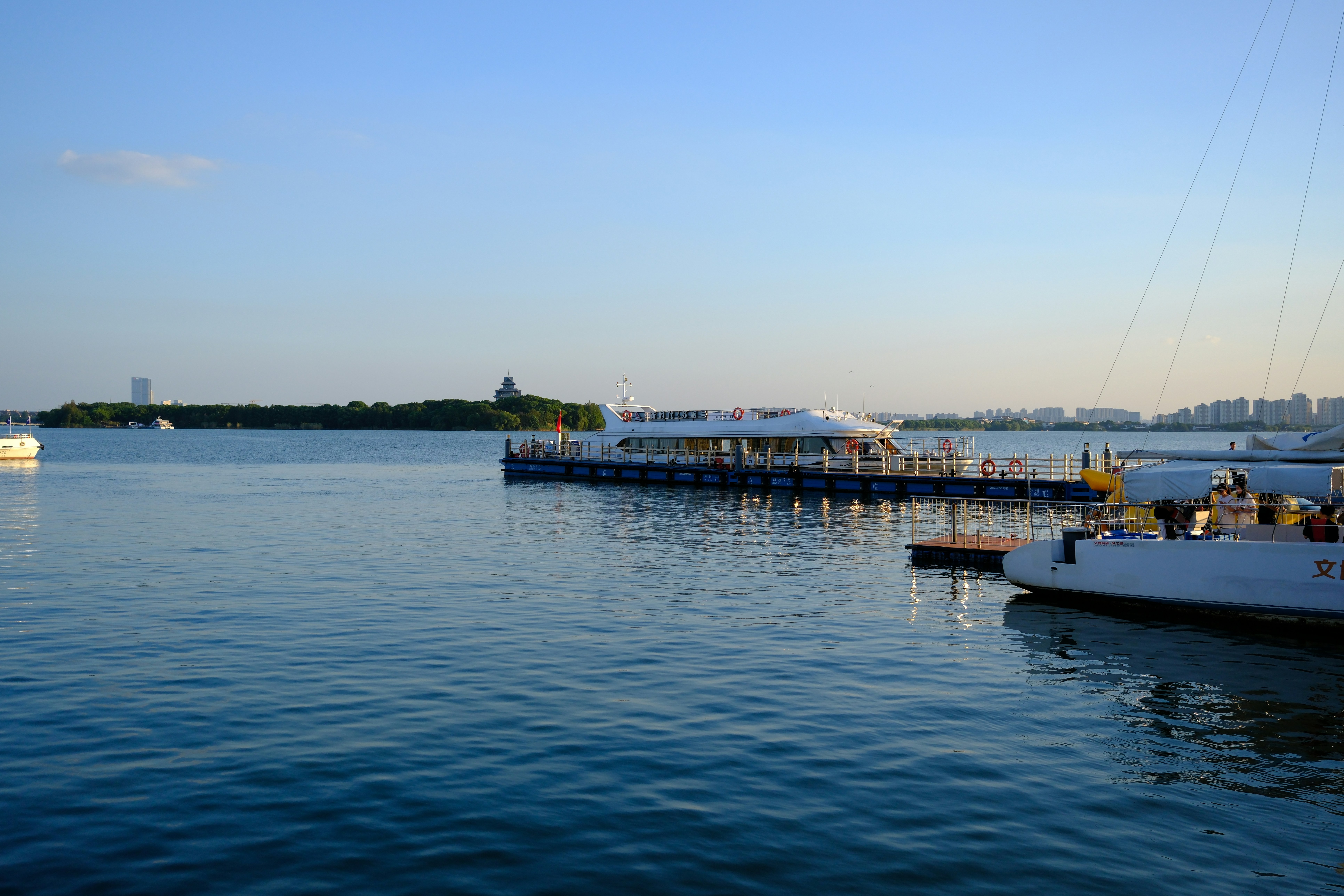 Harbor Calm: Boats Rest at Dusk-Blue Water