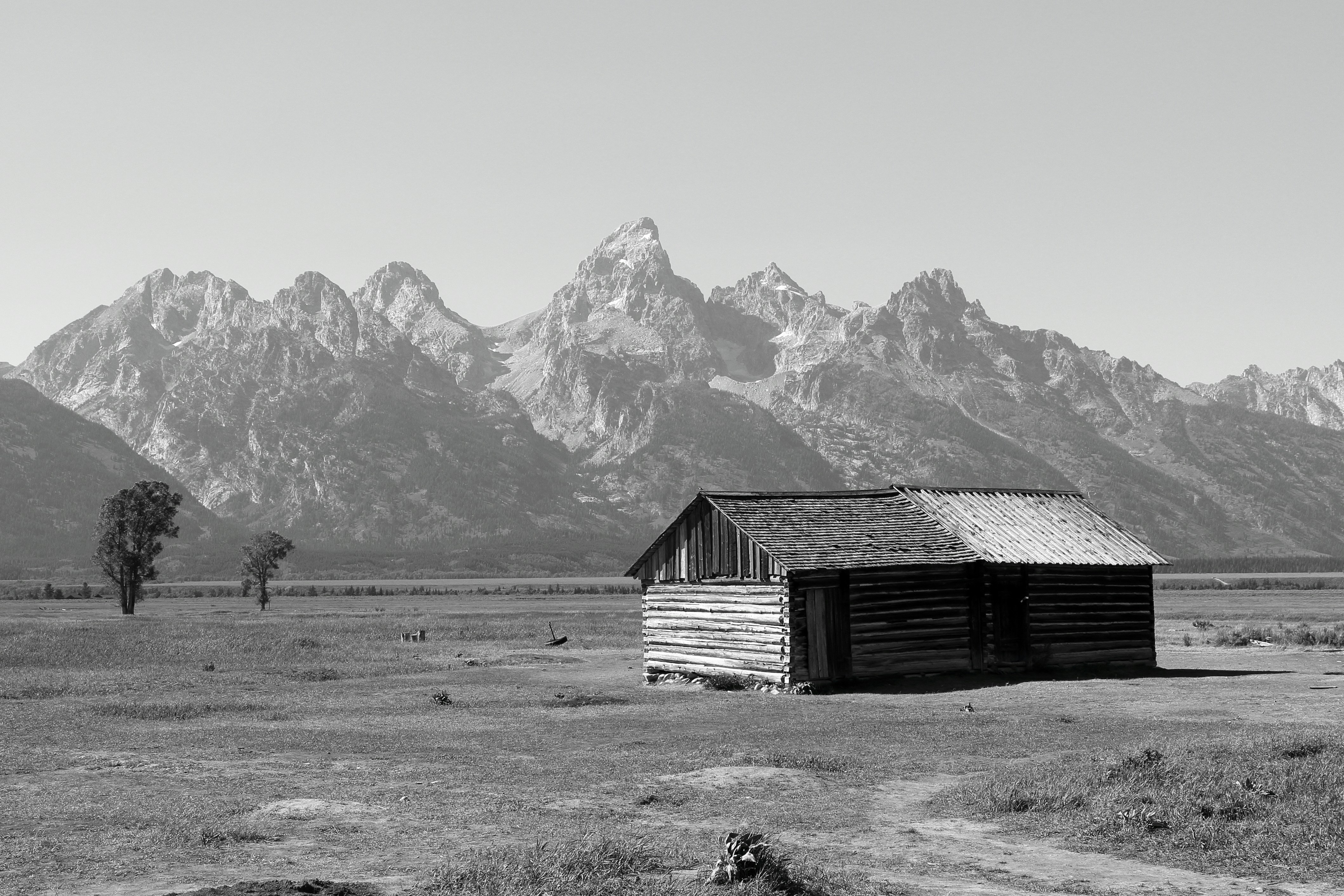Deserted Barn Beneath Tiered Peaks