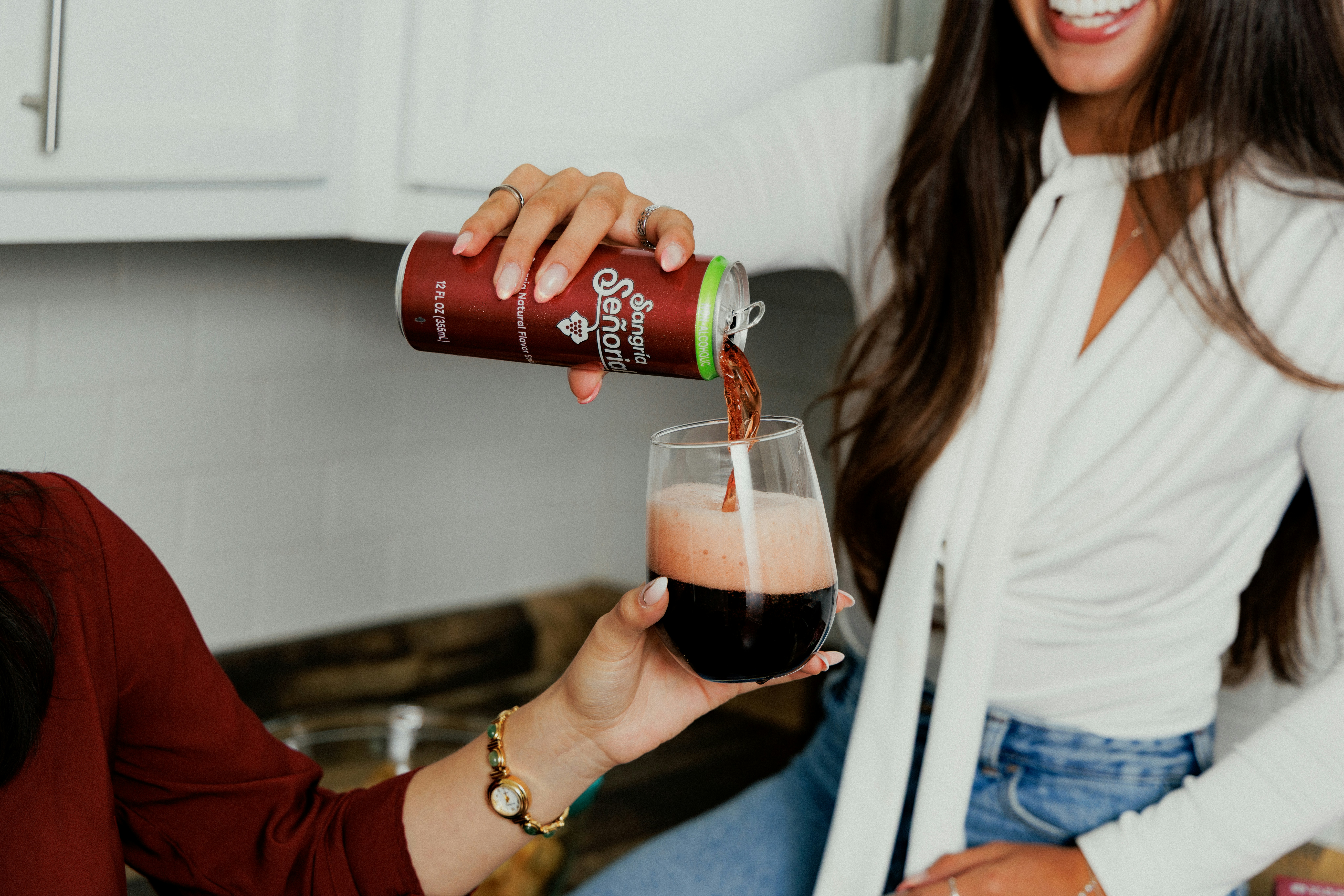 Pouring a Cheerful Glass: Friendship and Flavor in a Home Kitchen