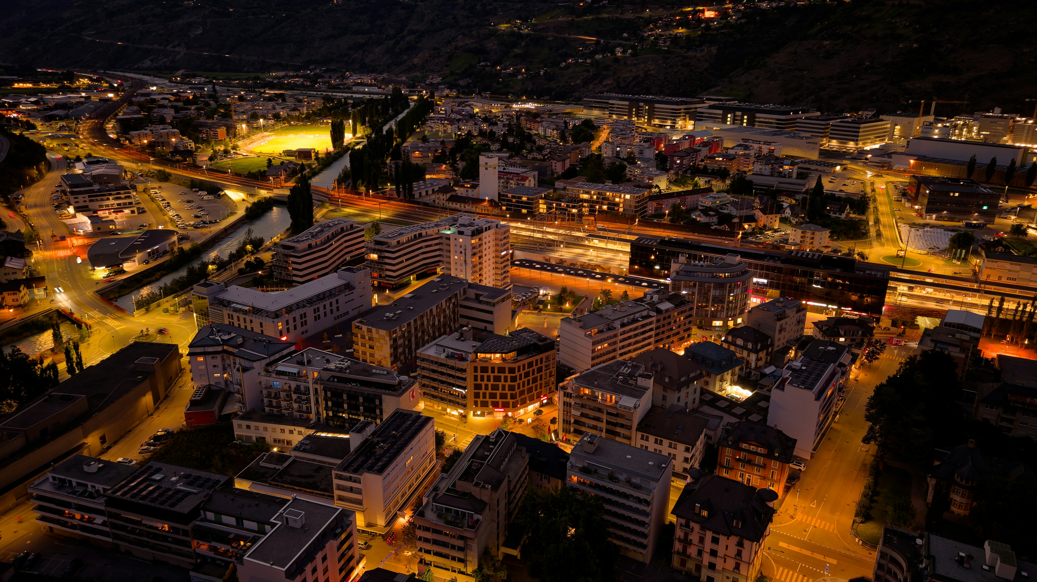 Nightfall Grid: A Quiet City Glow from Above