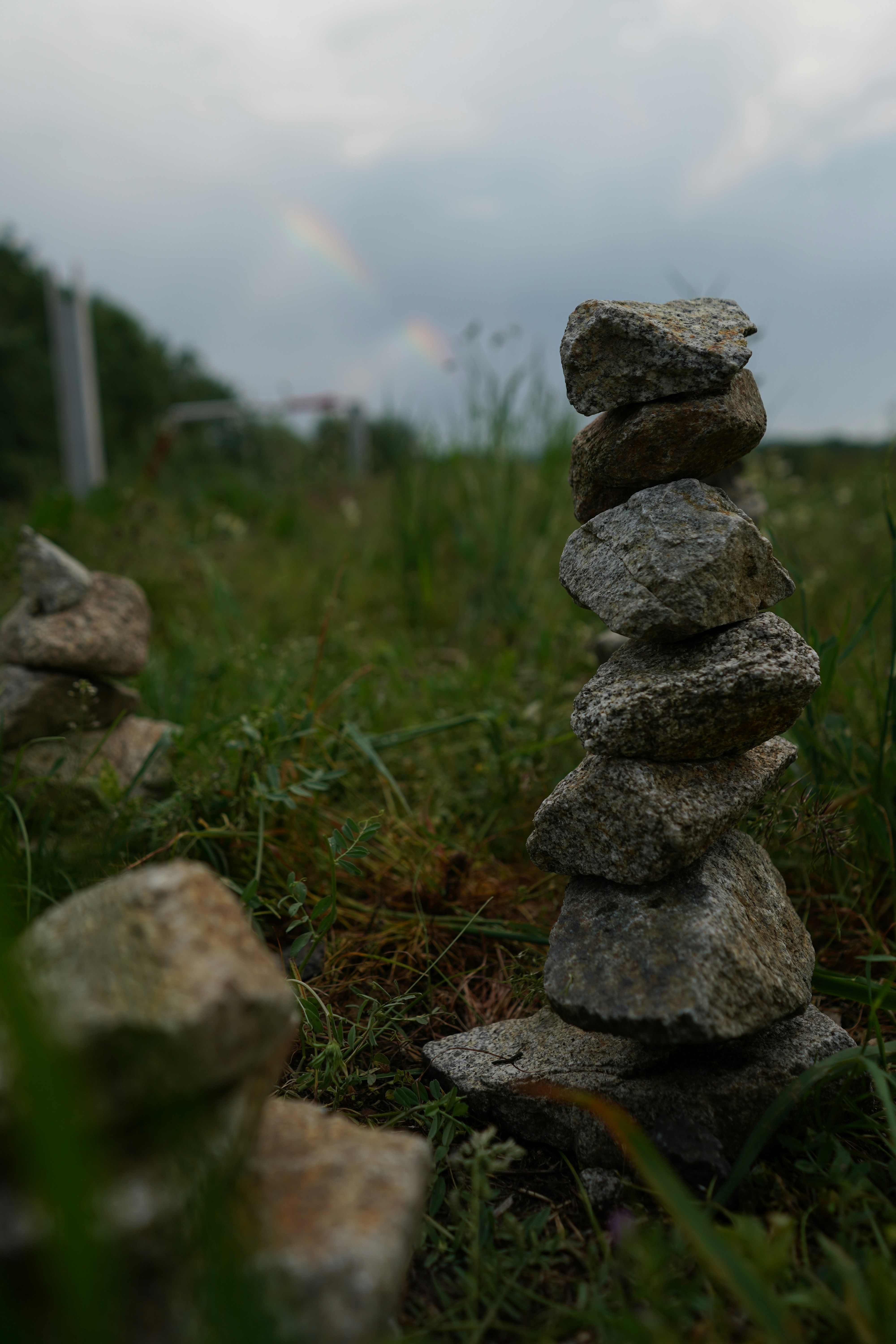 Balanced Stack: Stone Cairn Reaches Toward an Overcast Sky