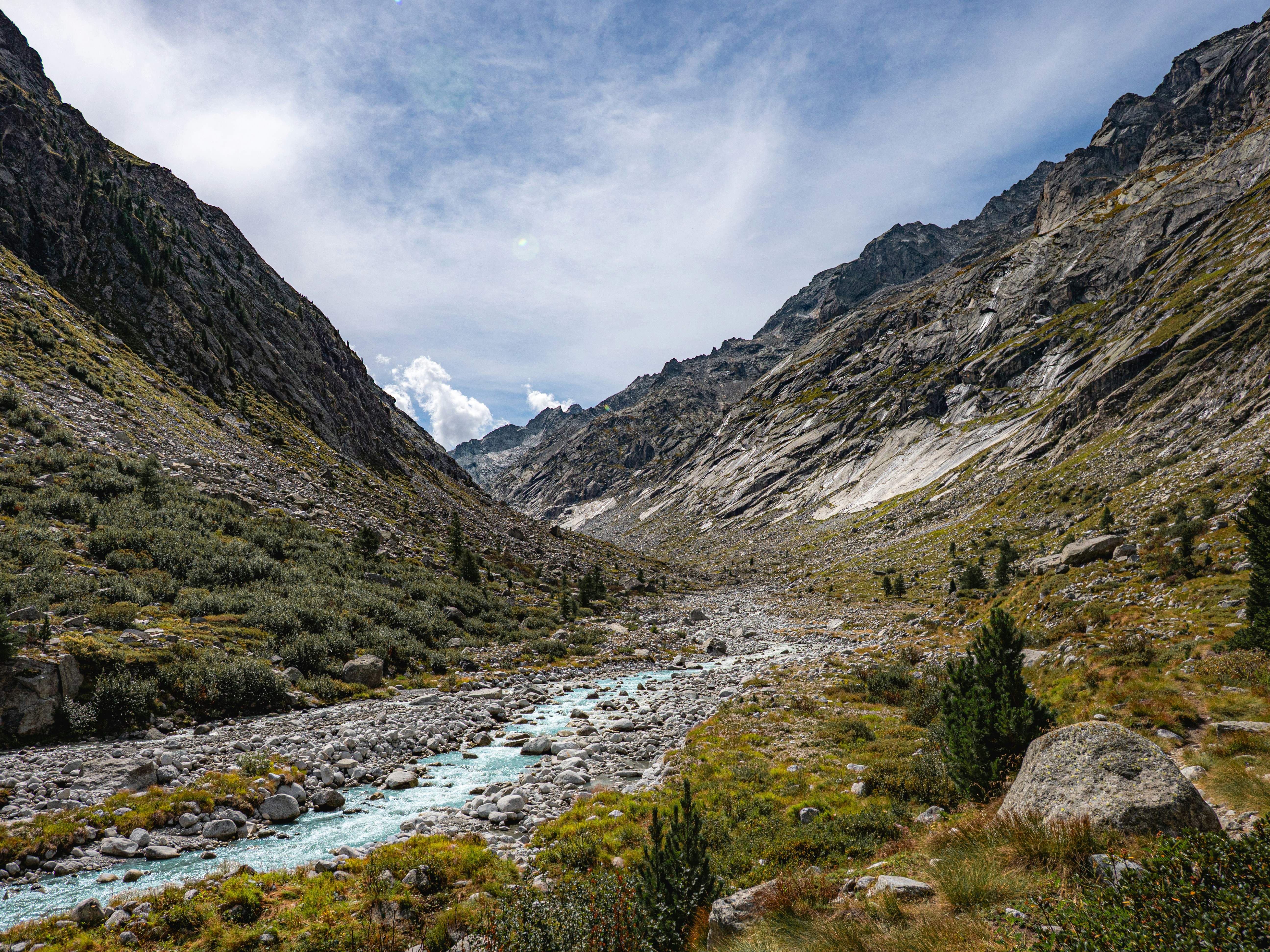 Valley Stream under Jagged Peaks
