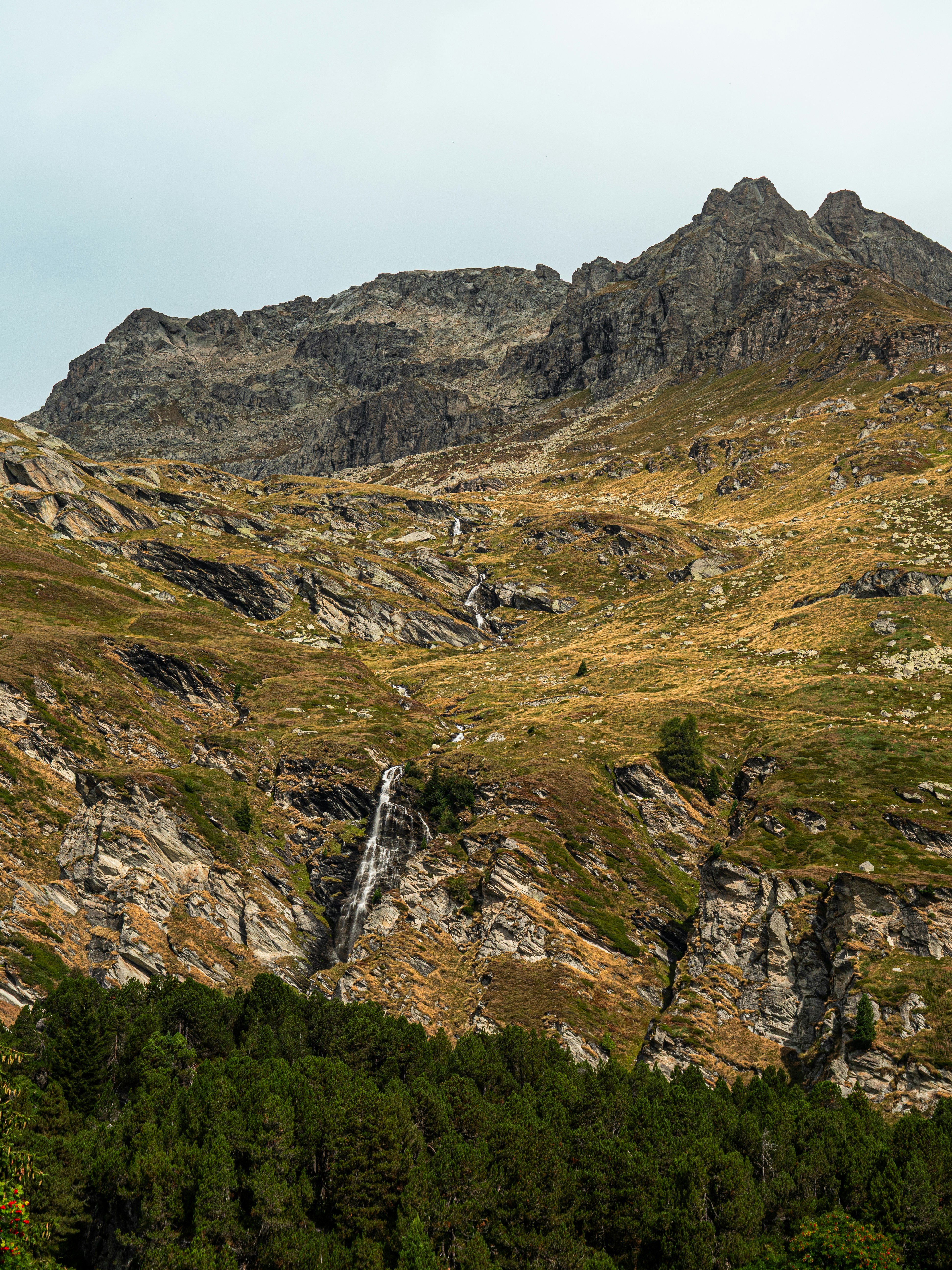 Stone Sentinel: A Highland Landscape Rising to Rugged Peaks