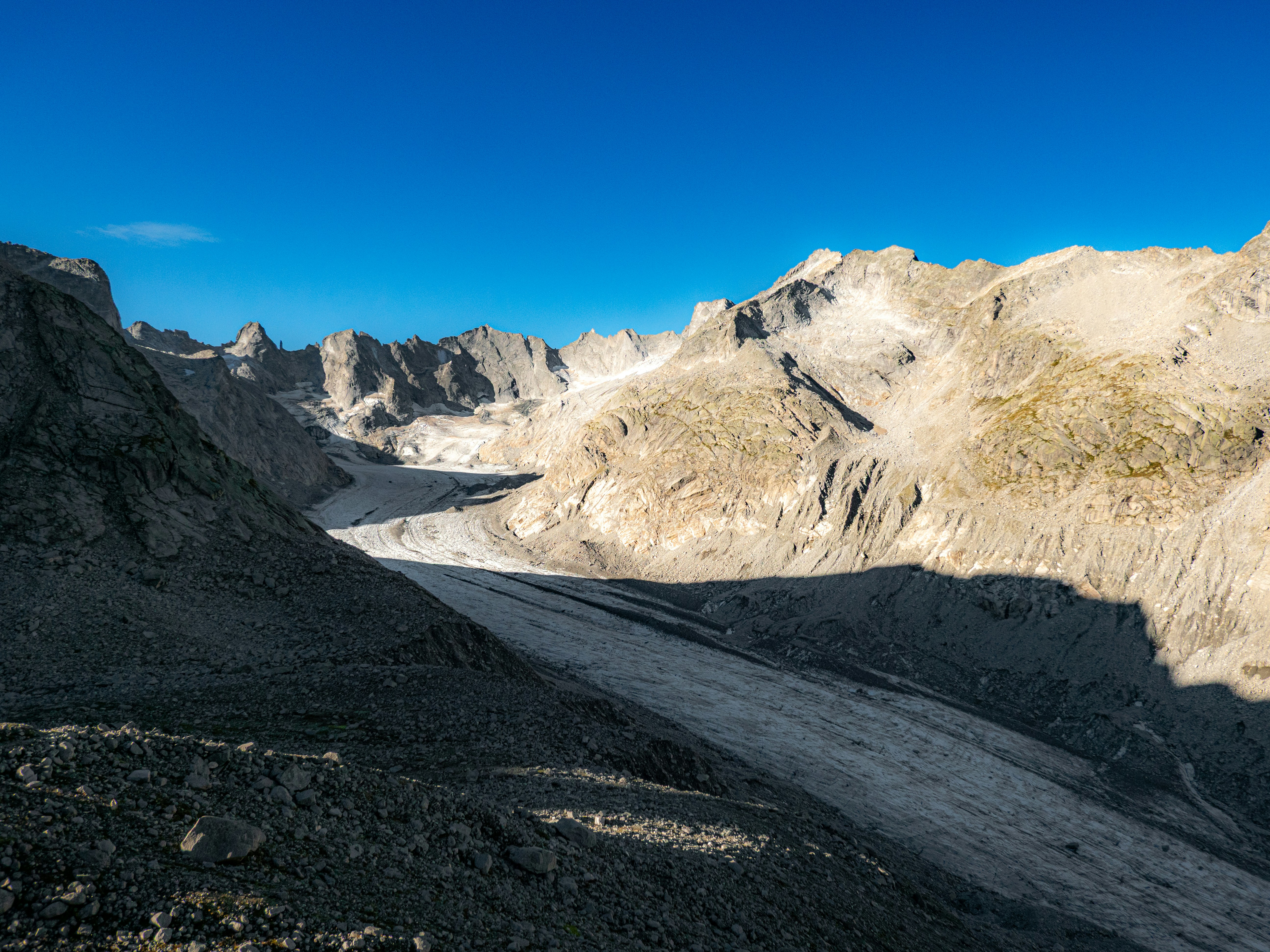 Sunlit Glacier Valley Rimming a Bold Alpine Ridge