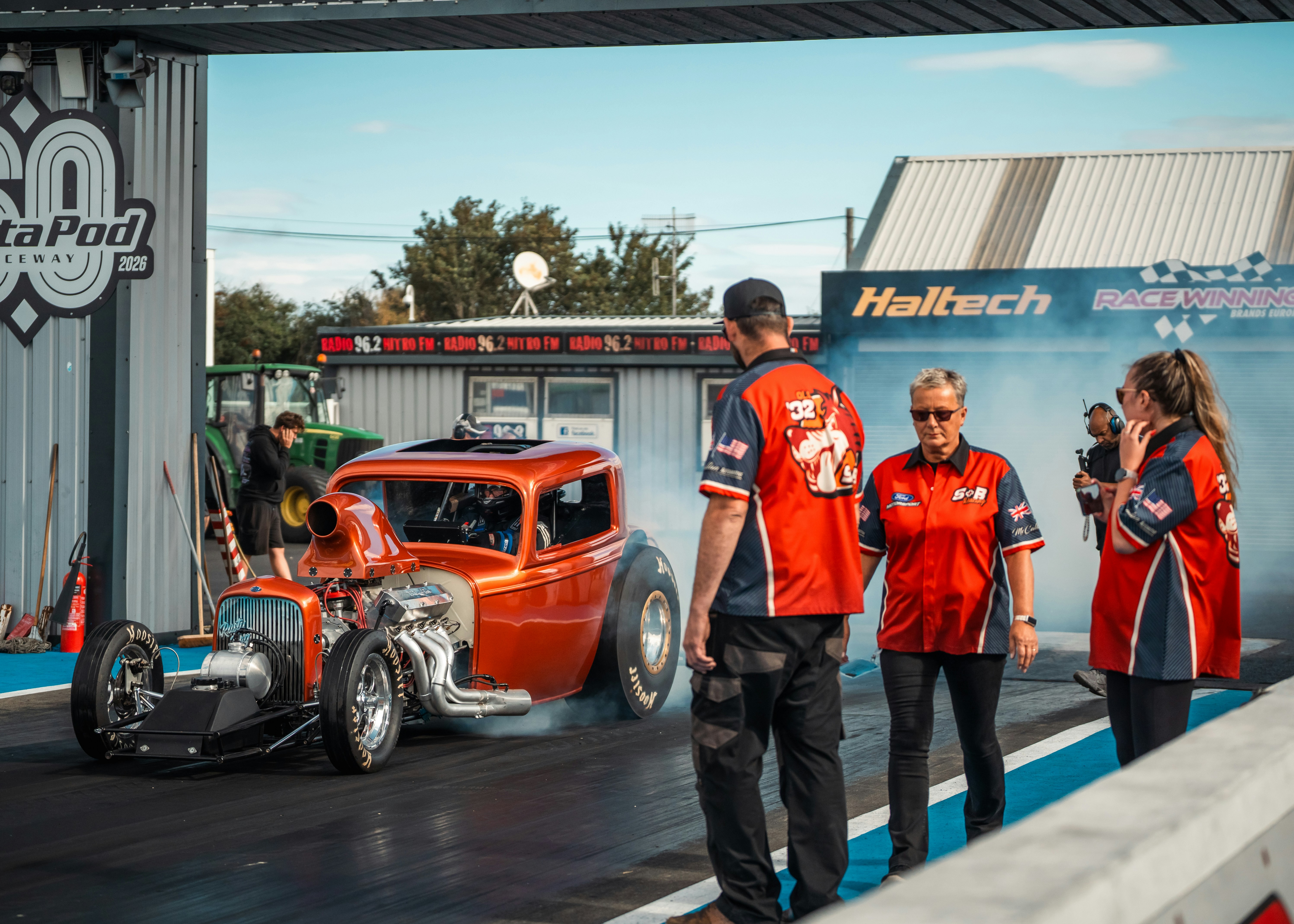 Hotrod at the Ready: Crew and Chrome Glimpse the Drag Strip