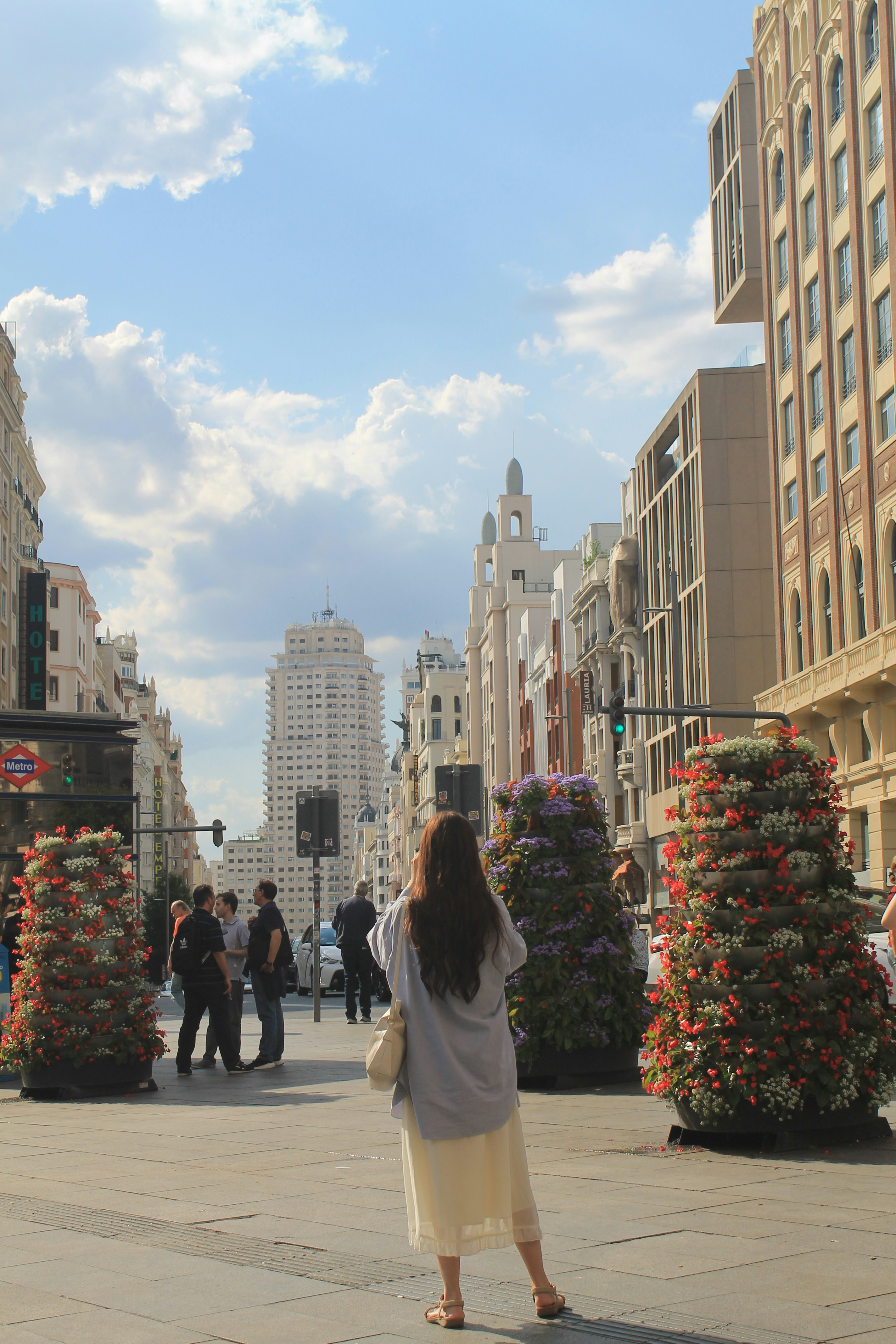City Pedestal: A Woman Faces the Avenue