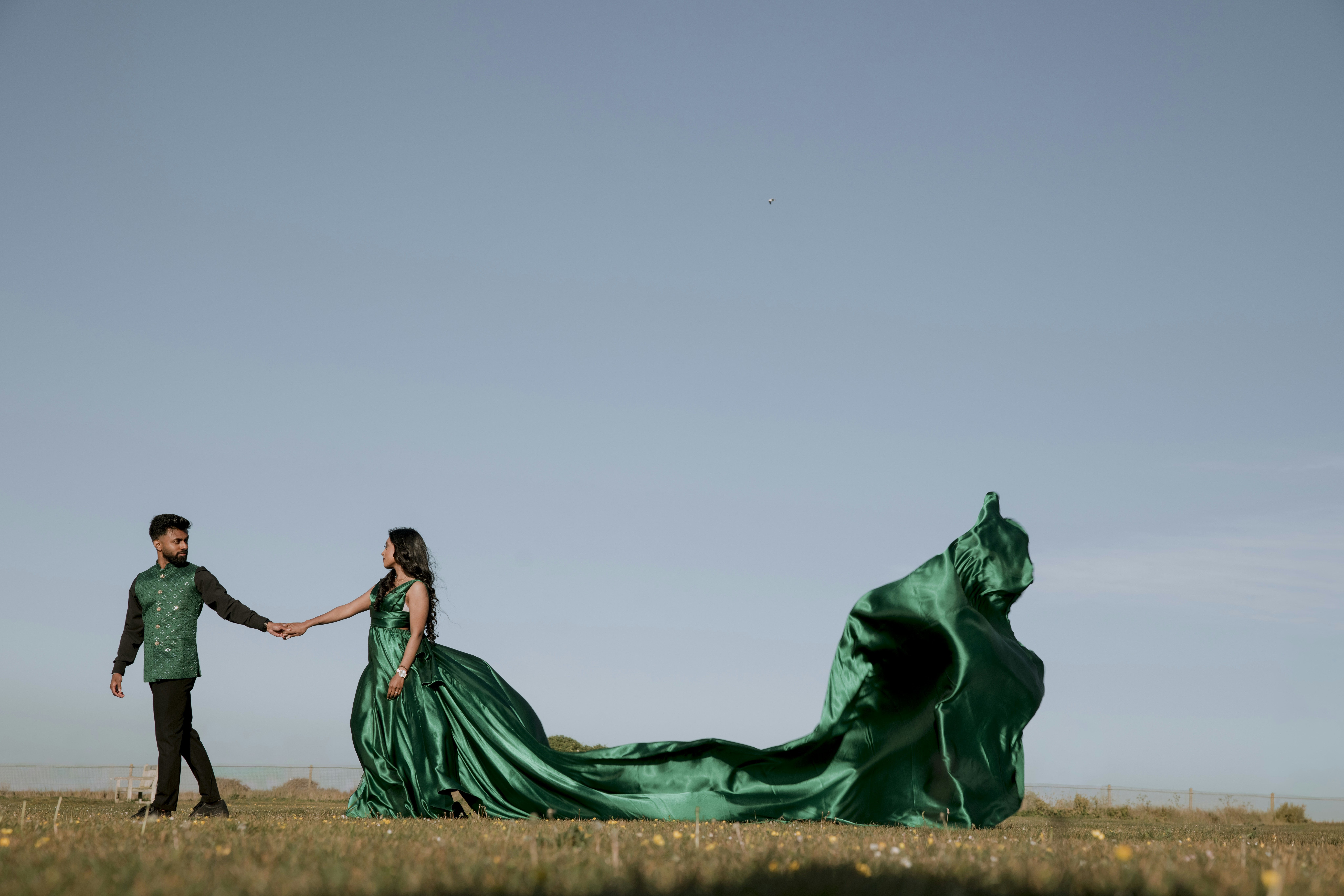 Emerald Drift: A Green Dress Reaches for the Horizon