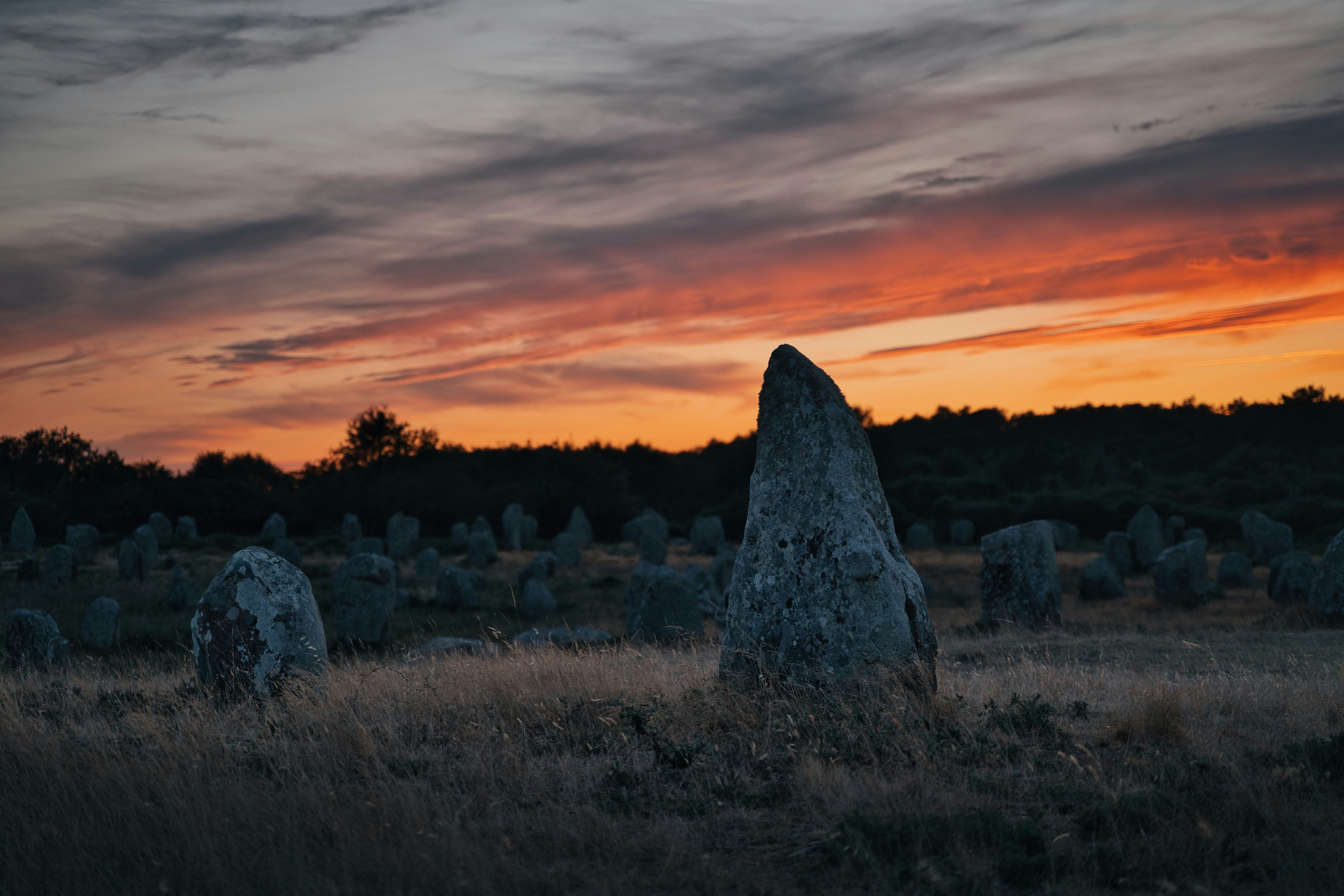 Sunset Sentinel: A Ring of Time Standing in the Dusk