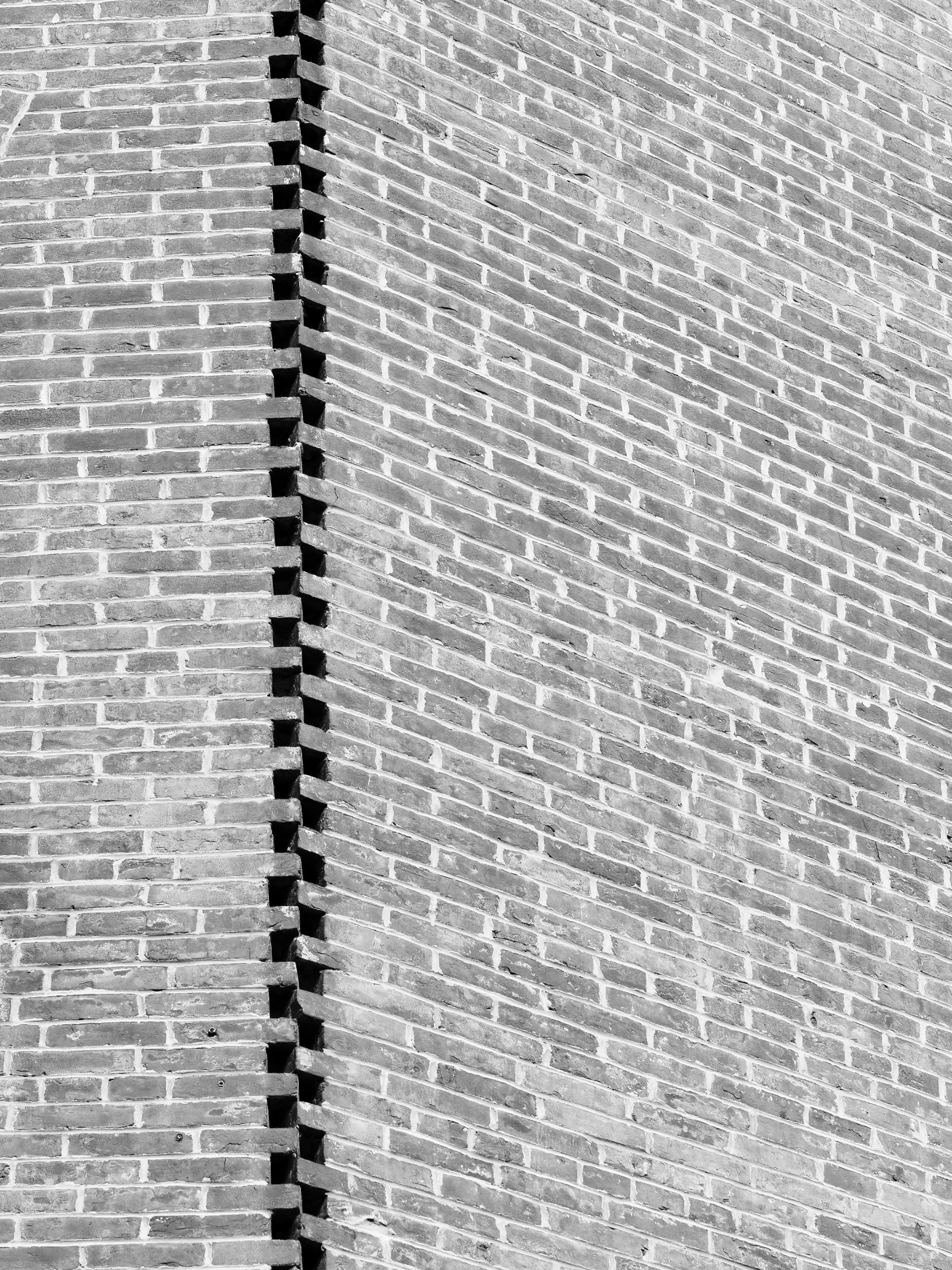 Split Veil: The Bricked Boundary where Geometry Meets Grain