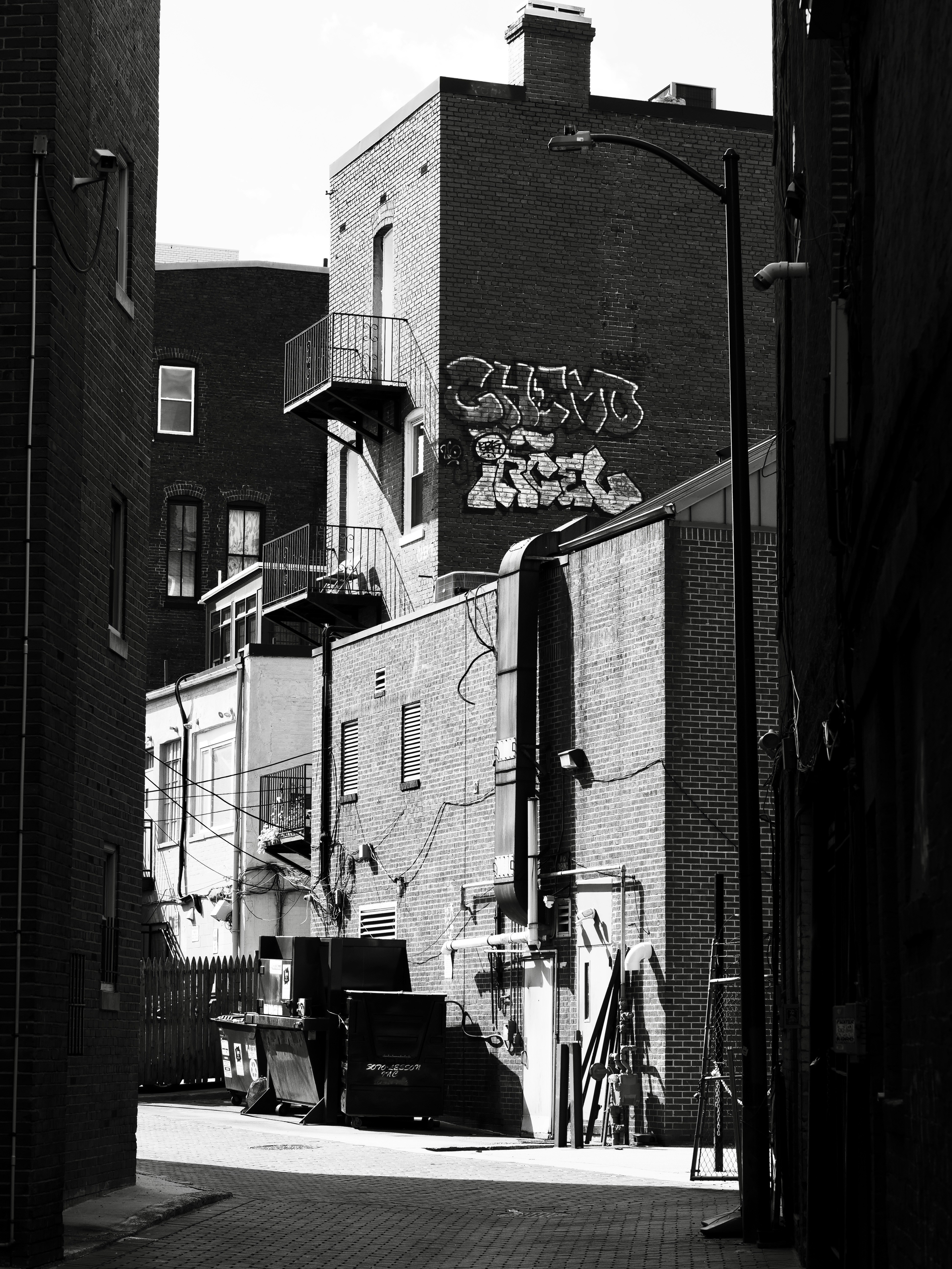 Urban Backstage: Graffiti Stairway and Alleyway Light