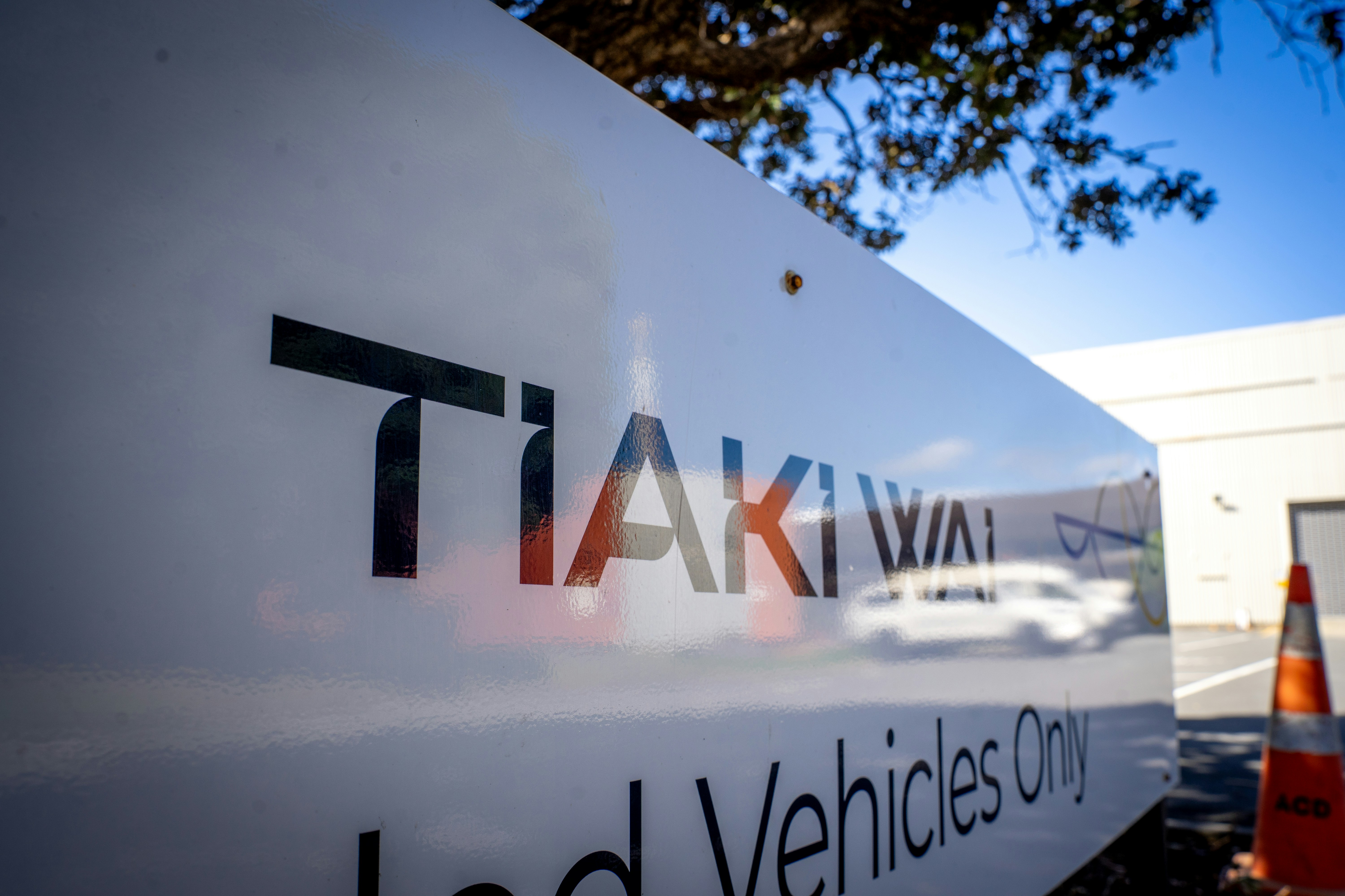 Signage in Focus: Industrial Banner with Partial Text