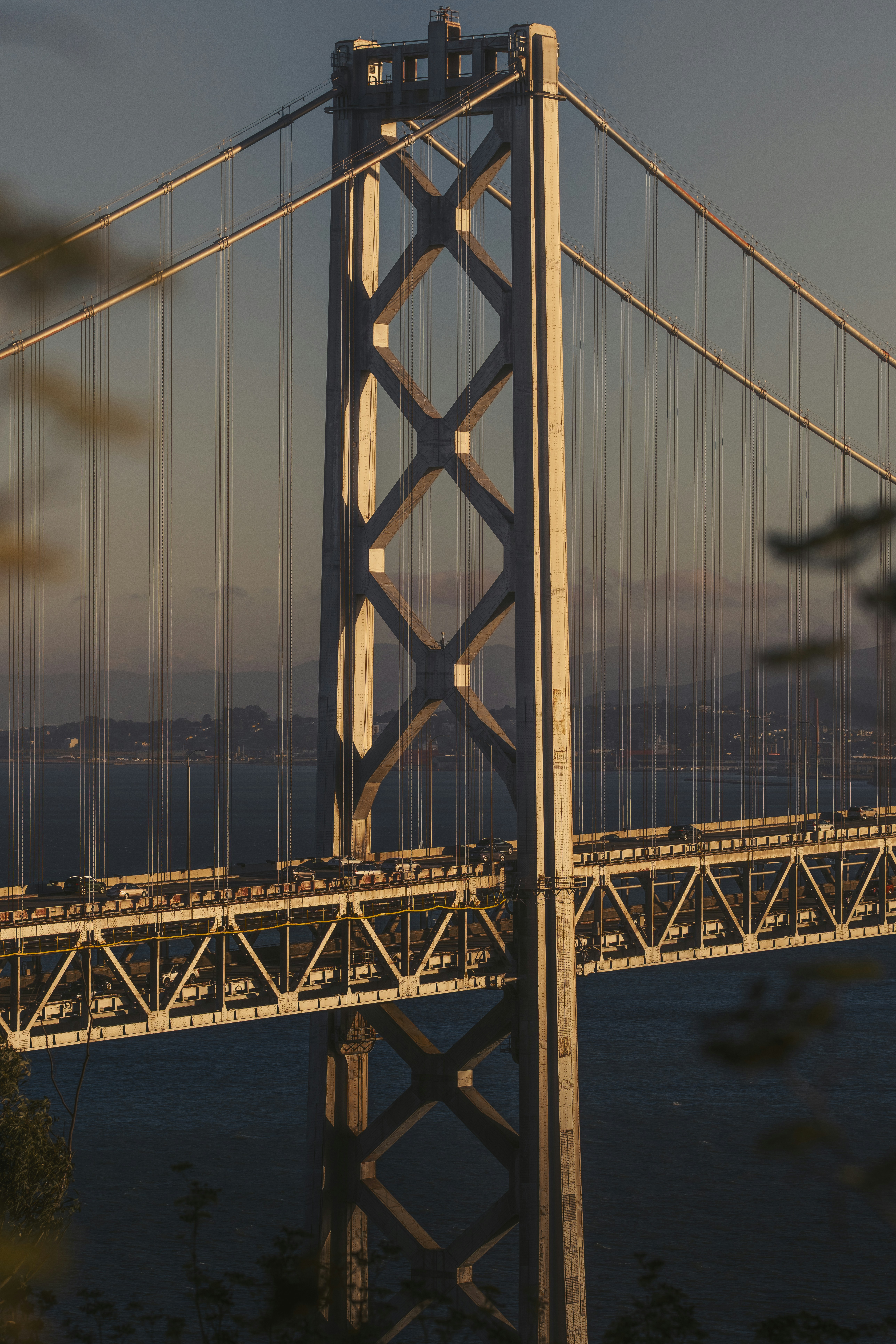 Towering Geometry: The Central Span of a Pacific Bridge at Golden Hour