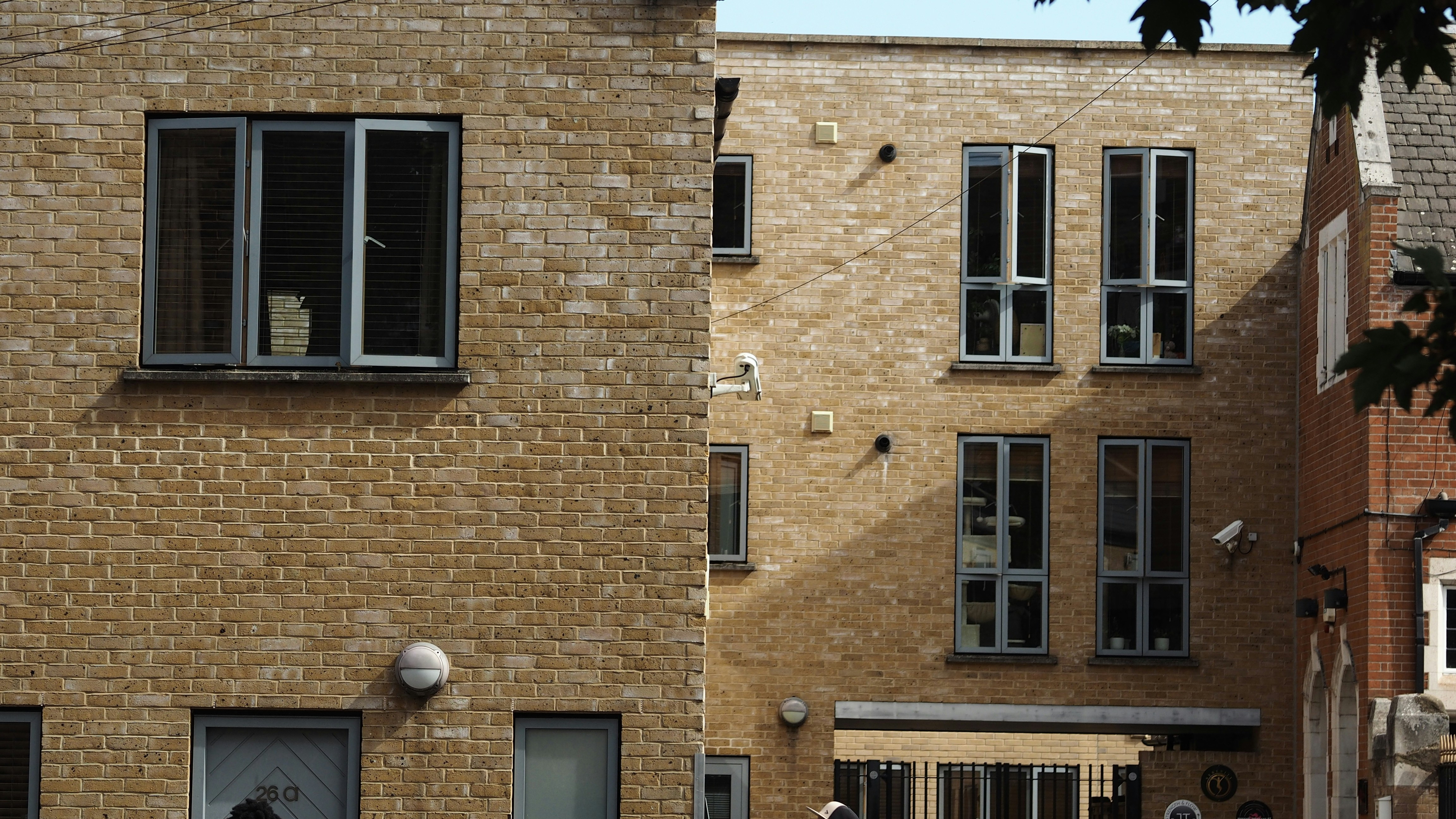 Brick Facade and Geometry: Quiet Urban Echoes