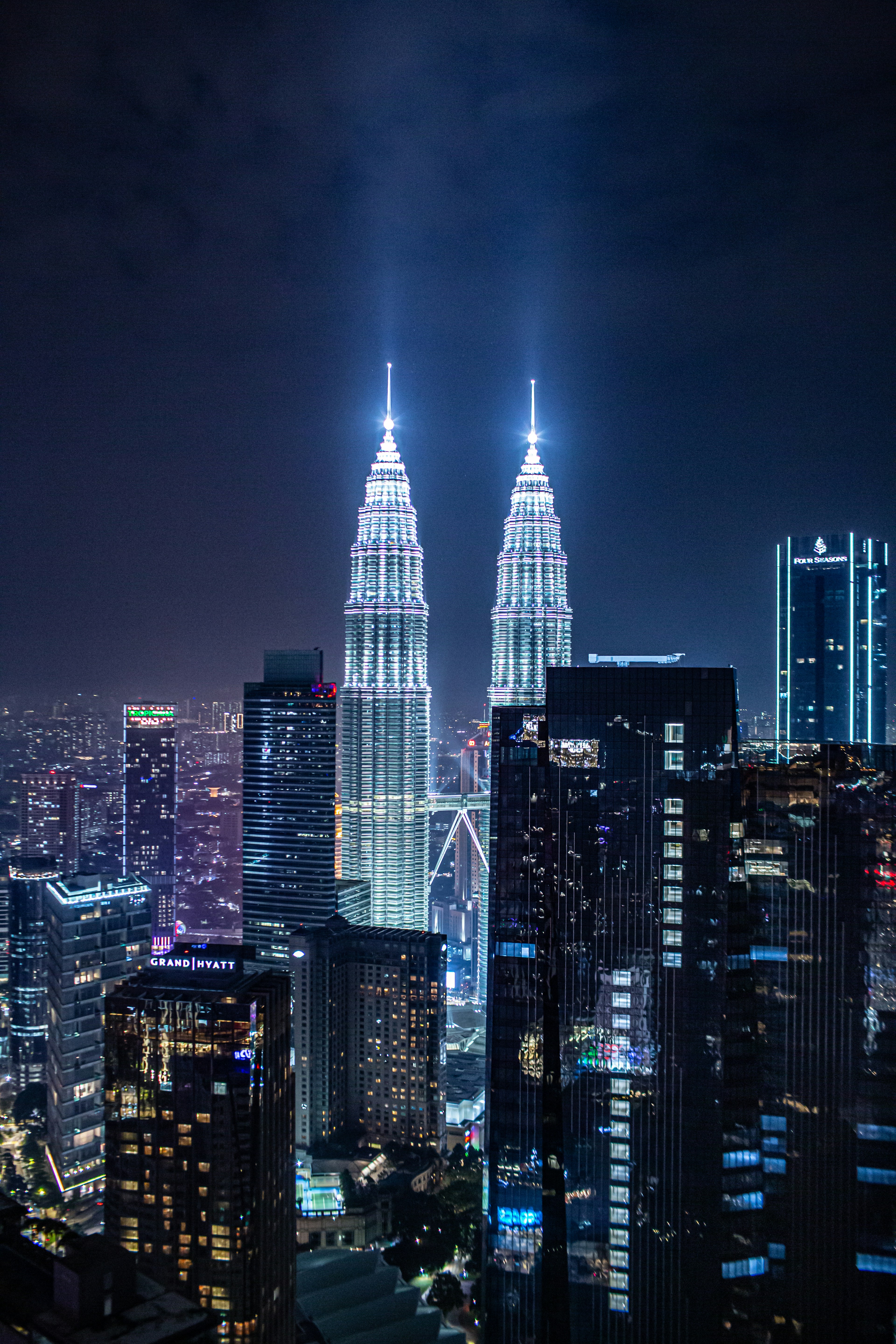 Twin Towers in Neon Veil: Nightfall Over Kuala Lumpur