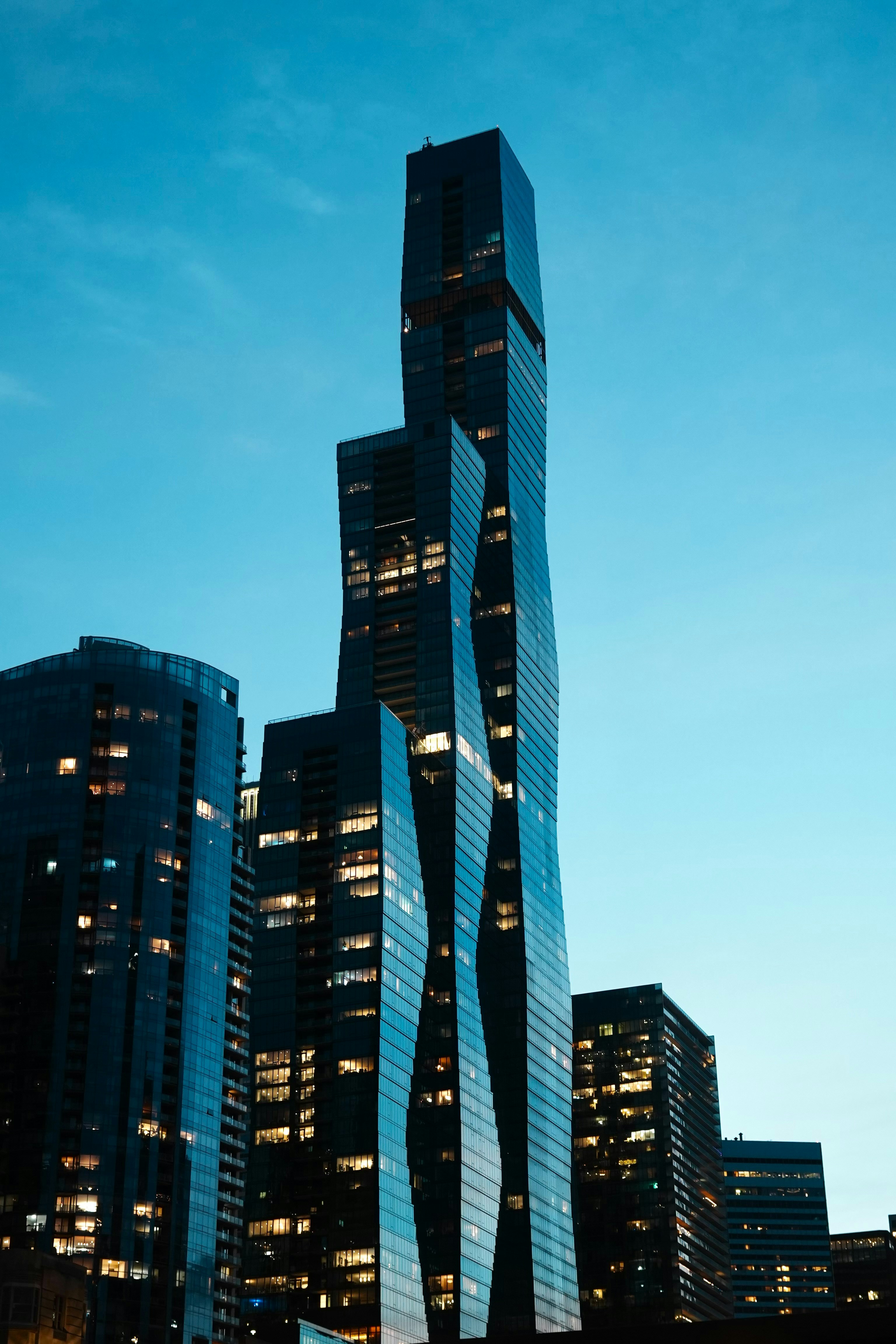 Skyward Twist: The Twin-Stacked Tower Reaches for the Evening Sky