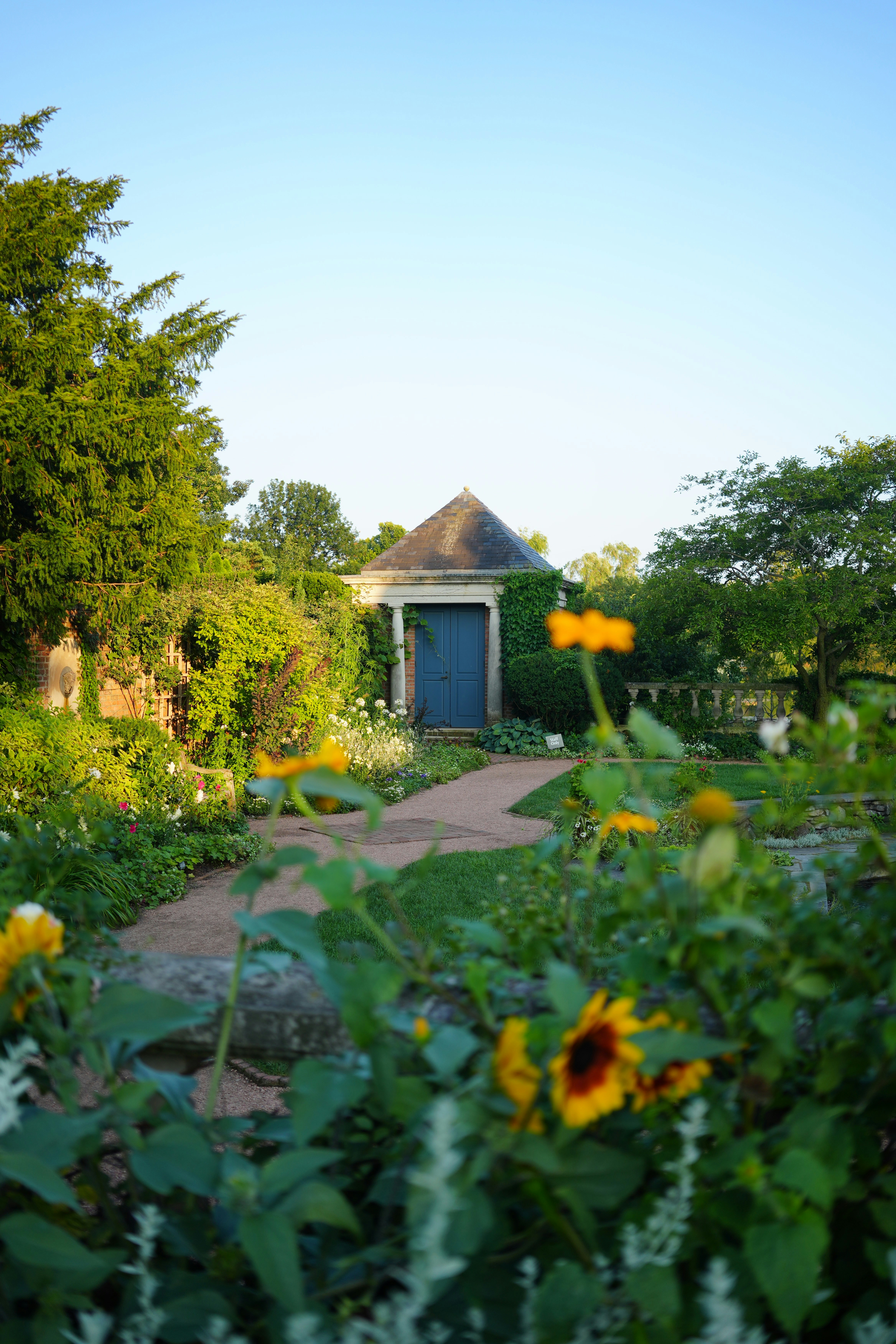 Hidden Temple in a Sunlit Garden