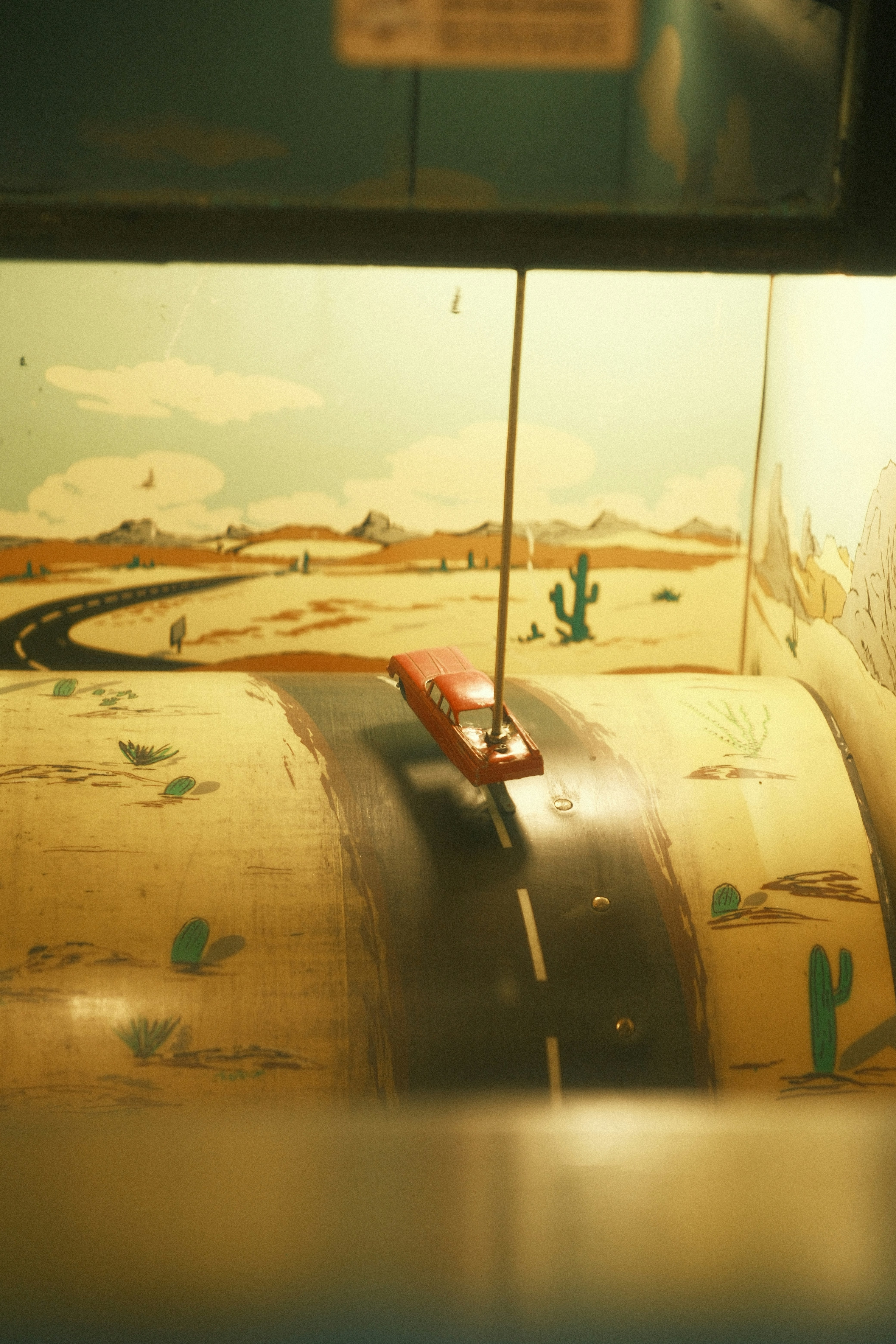 Miniature Desert Road Adrift on a Painted Cylinder